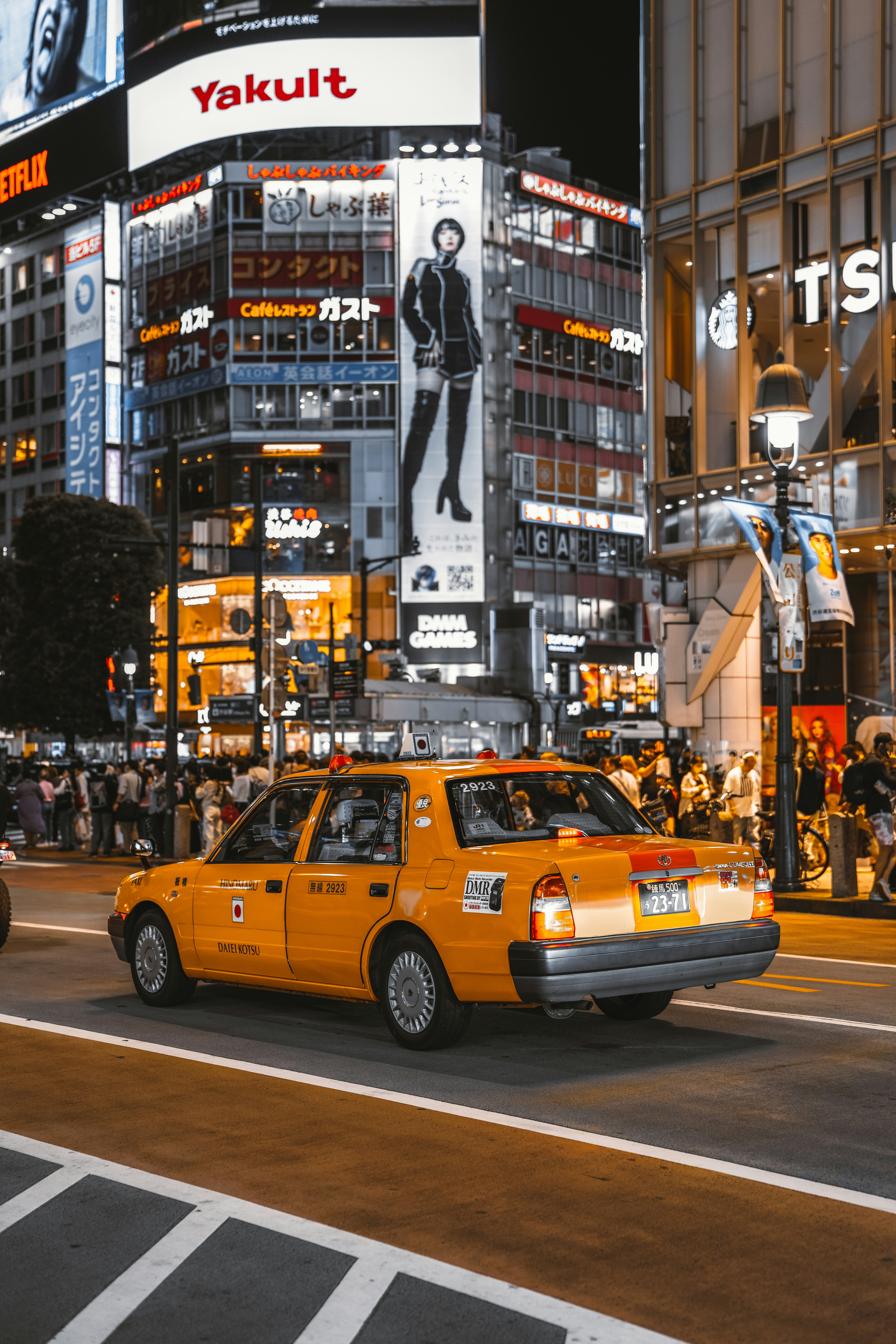 Neon Pulse in Shibuya: Yellow Taxi at Dusk