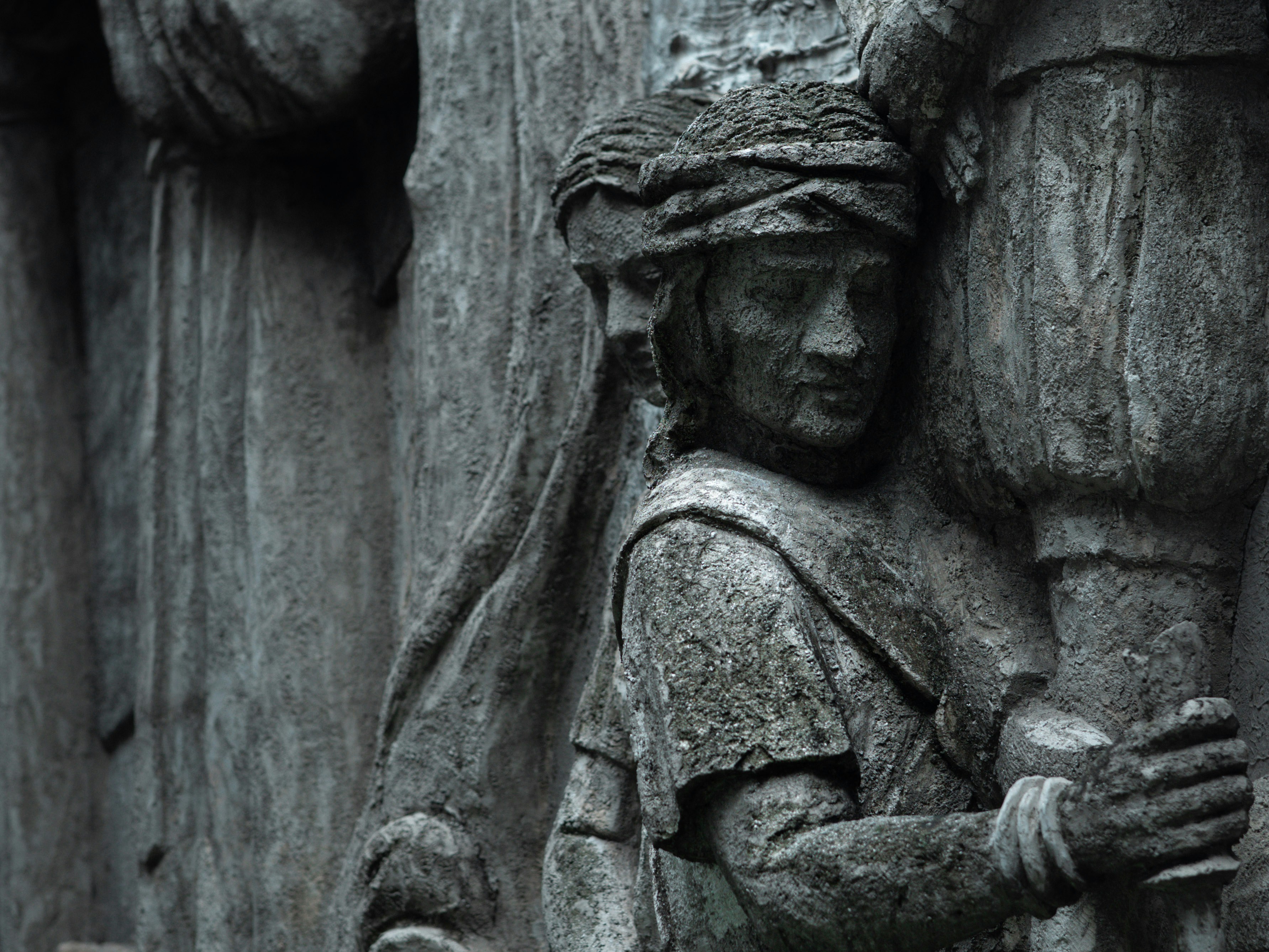 Stone Carved Sentinel: A Quiet Gaze in Granite