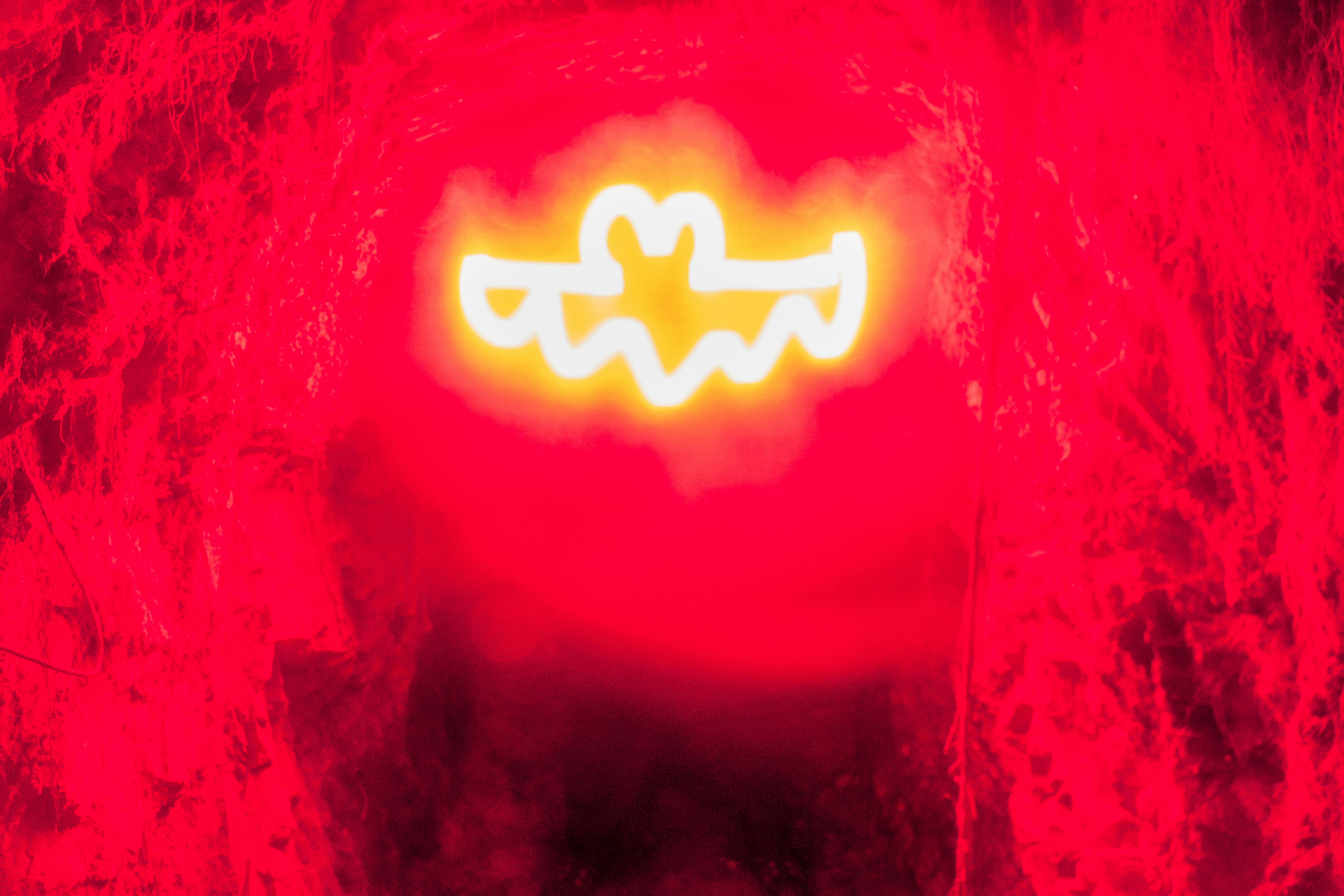 Neon Heartbeat in Red Subterranean Glow