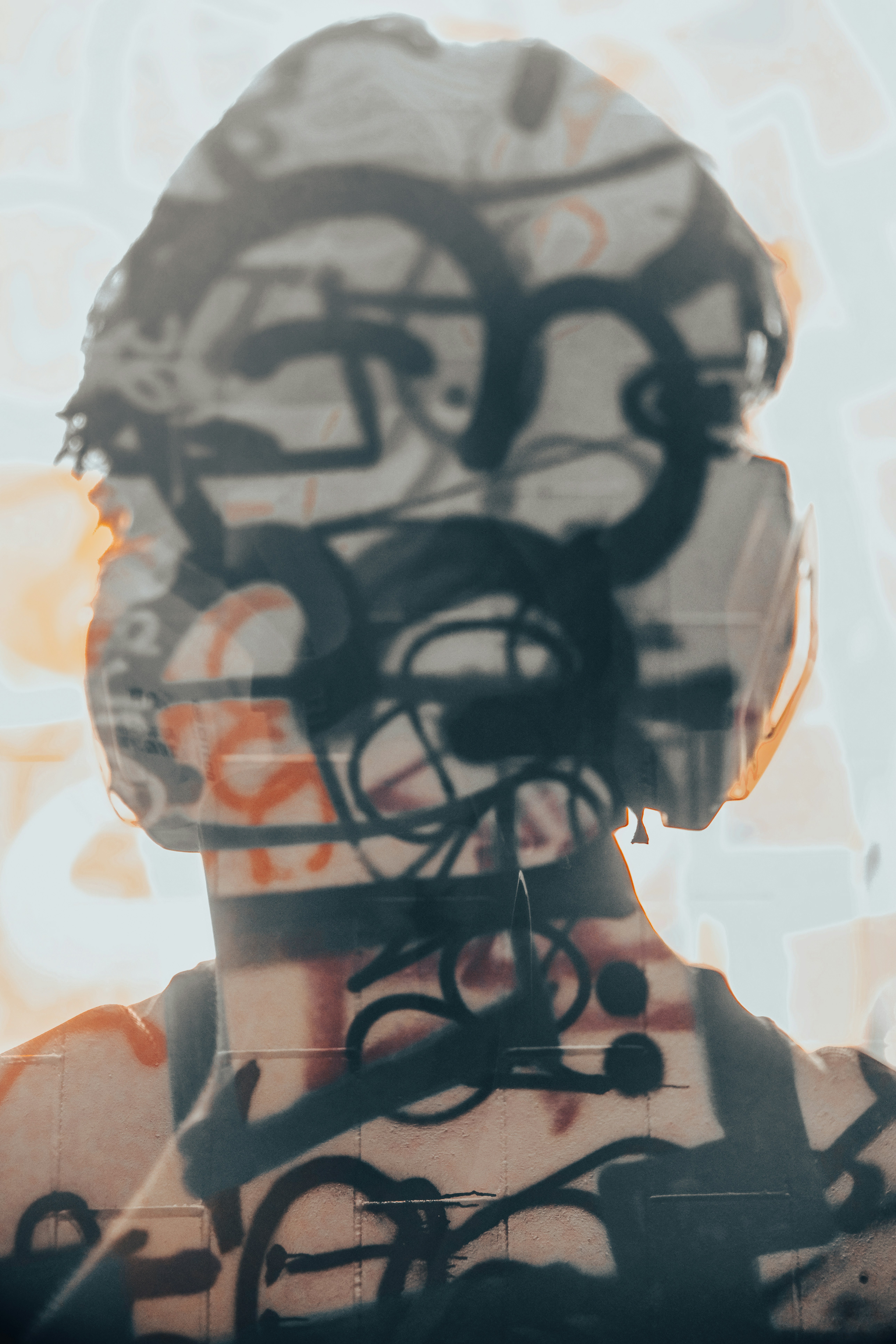 Shadowed Identity: Graffiti Overlay on a Silhouette