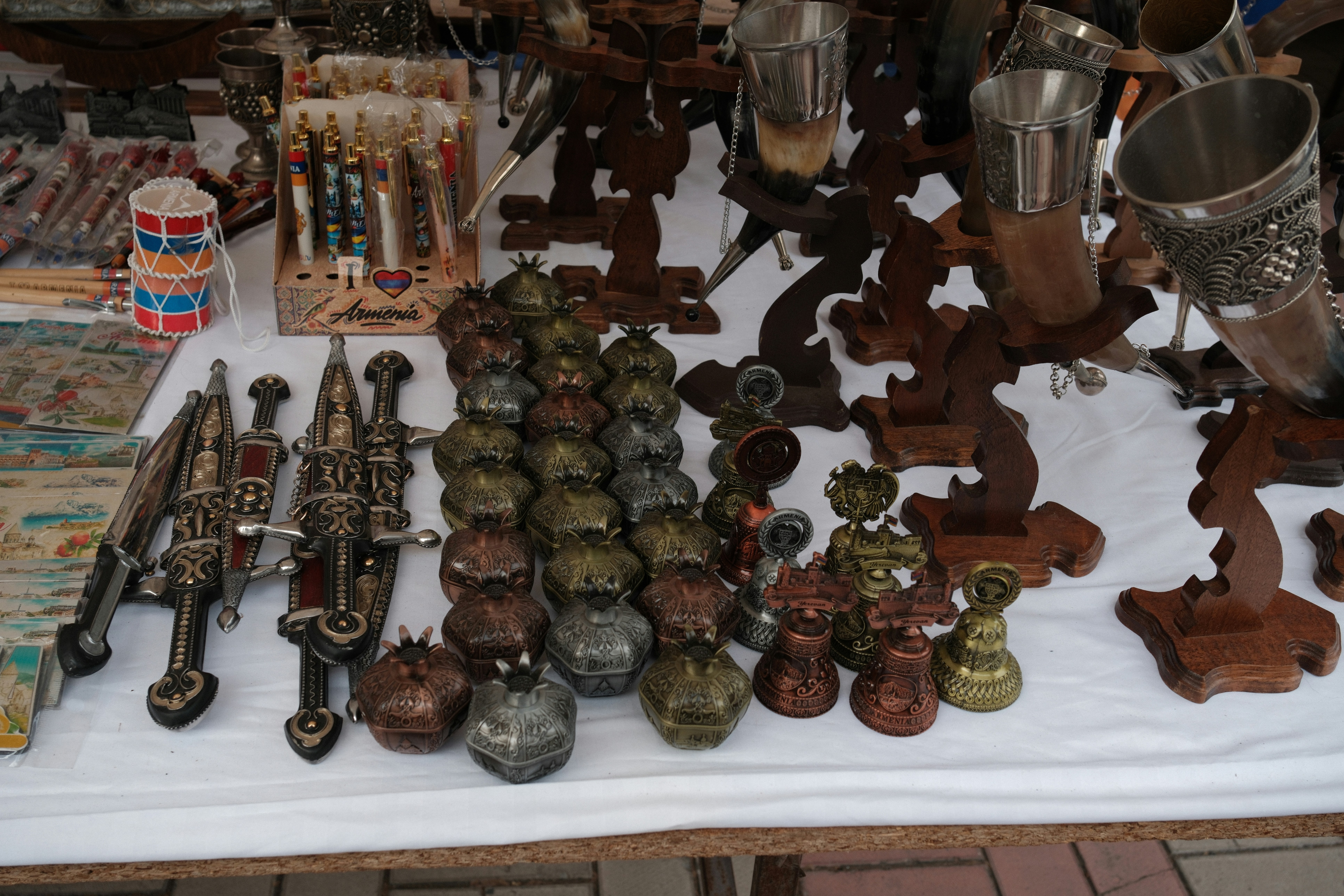 Ornamental Mementos and Druidic Figurines on a Market Stall
