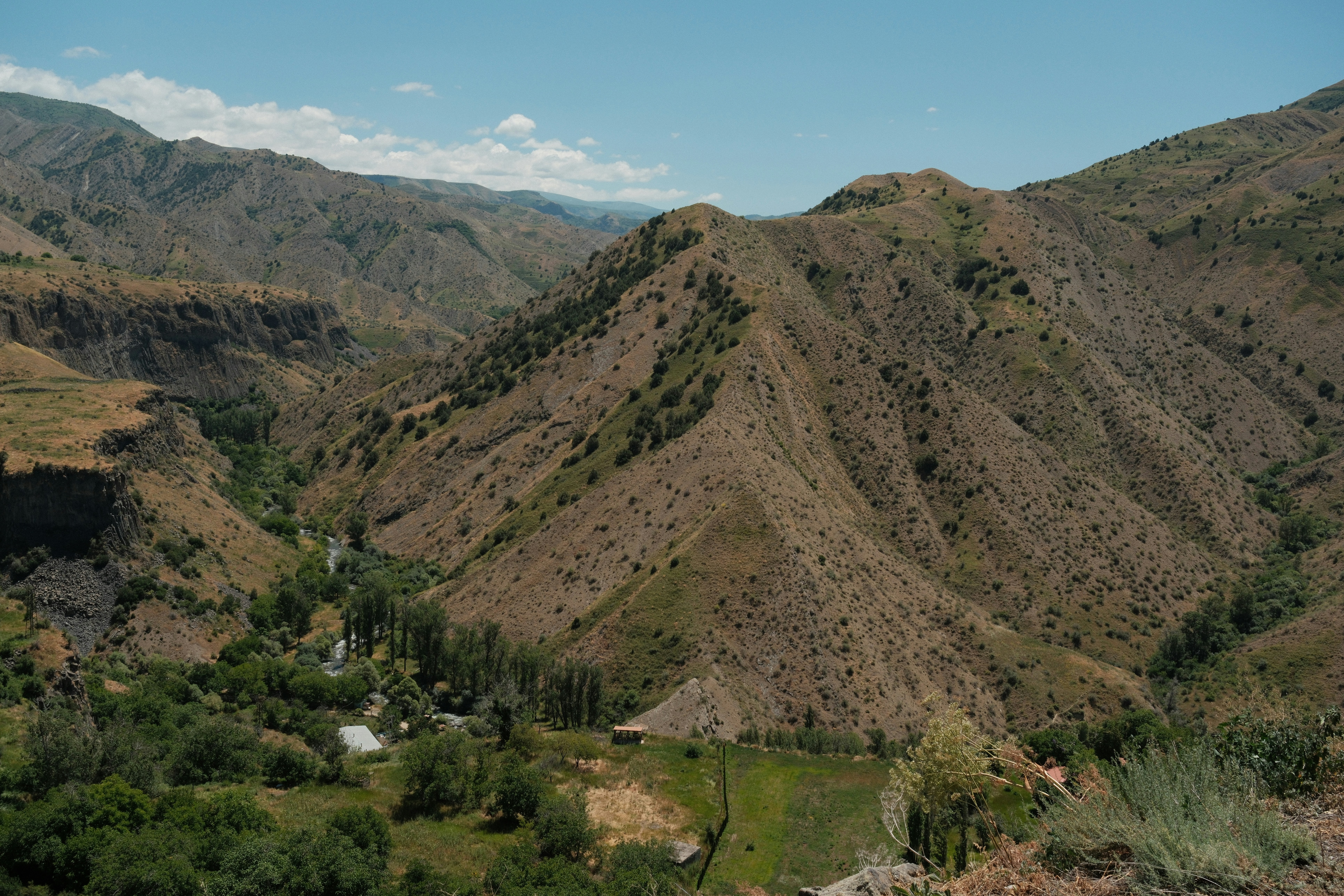 Desert Ridge Panorama: A Quiet Valley Between Carved Hills