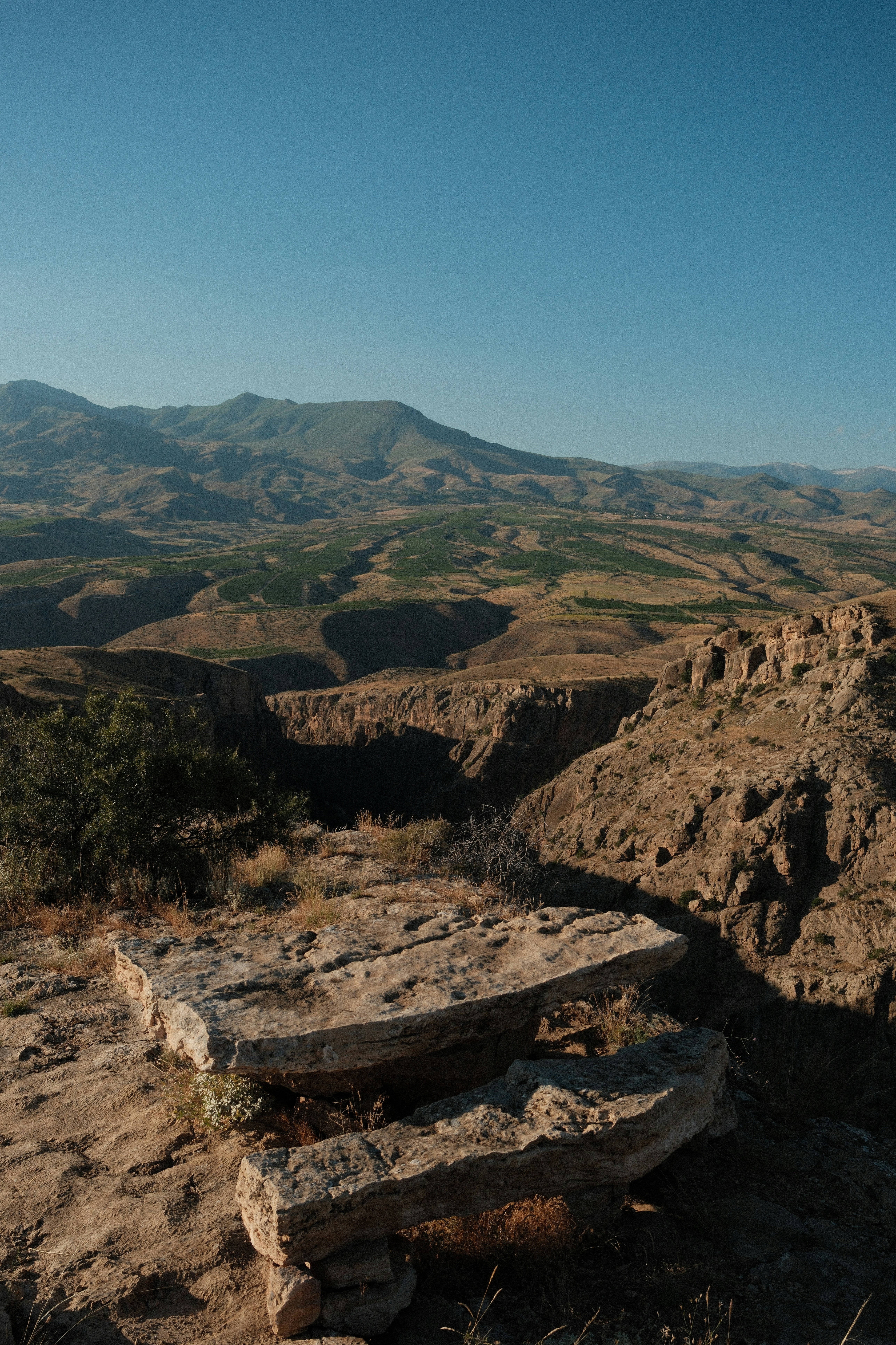 Layered Canyon Silence: Stone Steps and Distant Valleys
