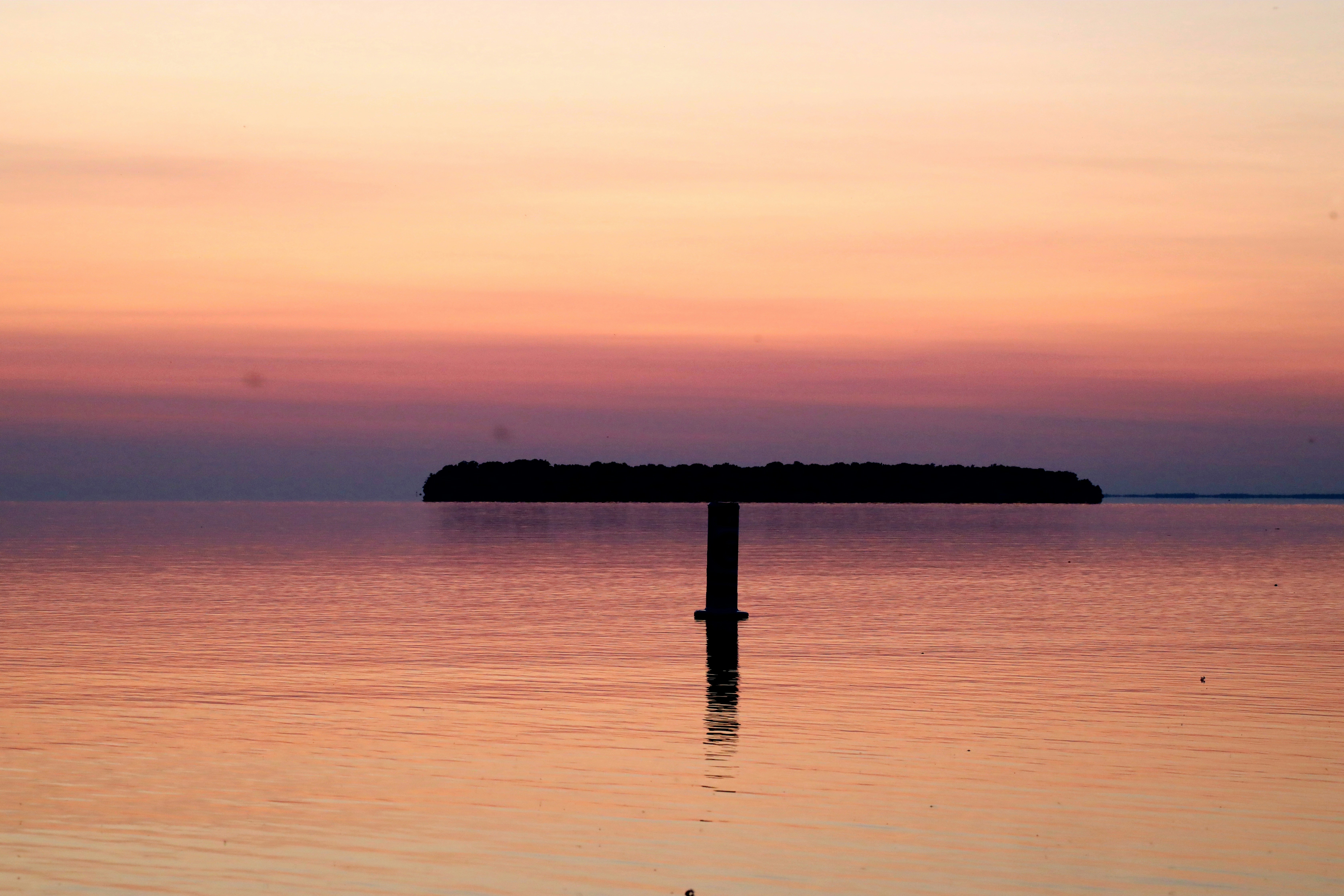Silhouette Platform: A Quiet Horizon at Sunset