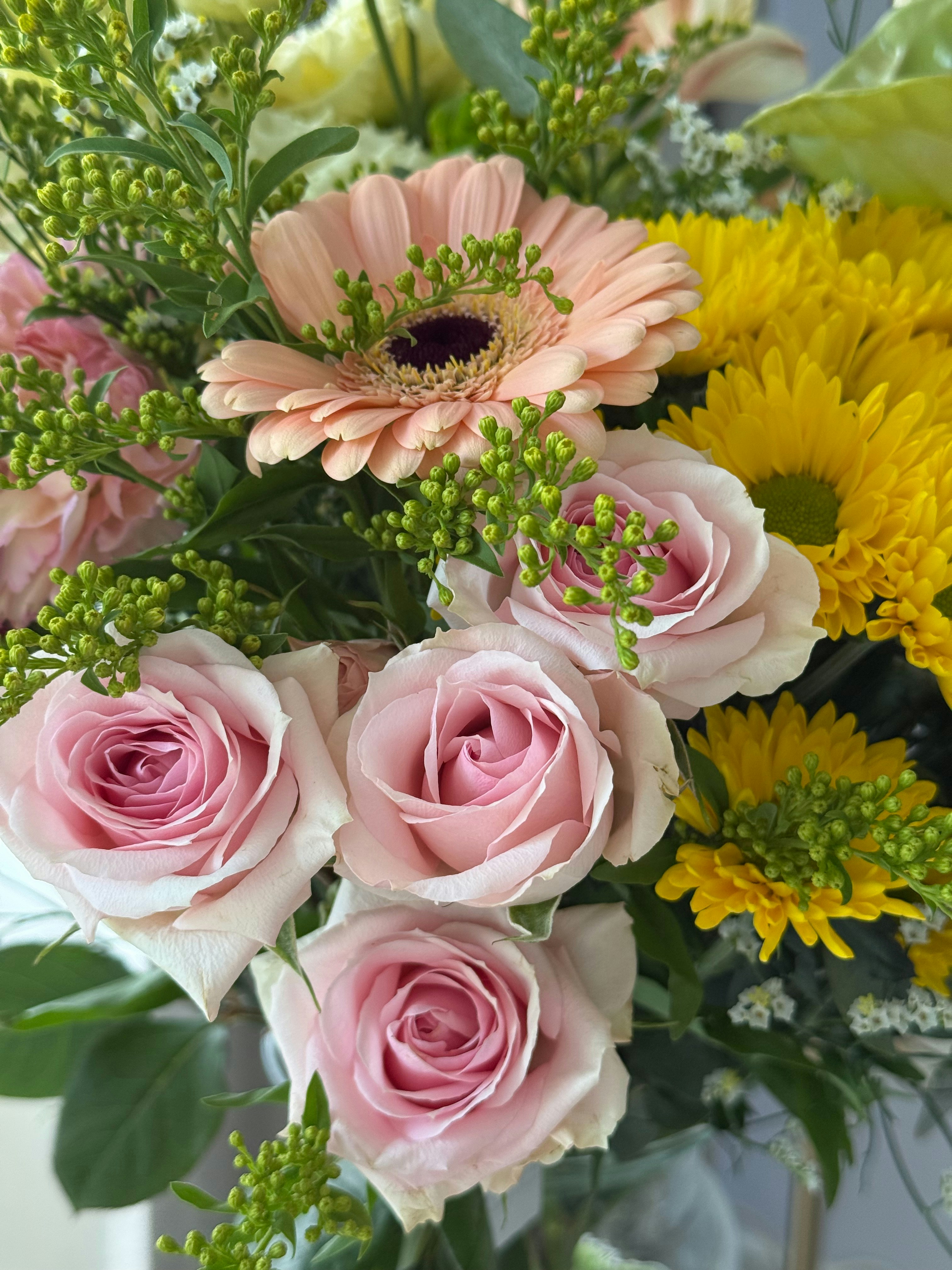 Soft Pink Roses Meet Golden Sun—A Floral Mosaic