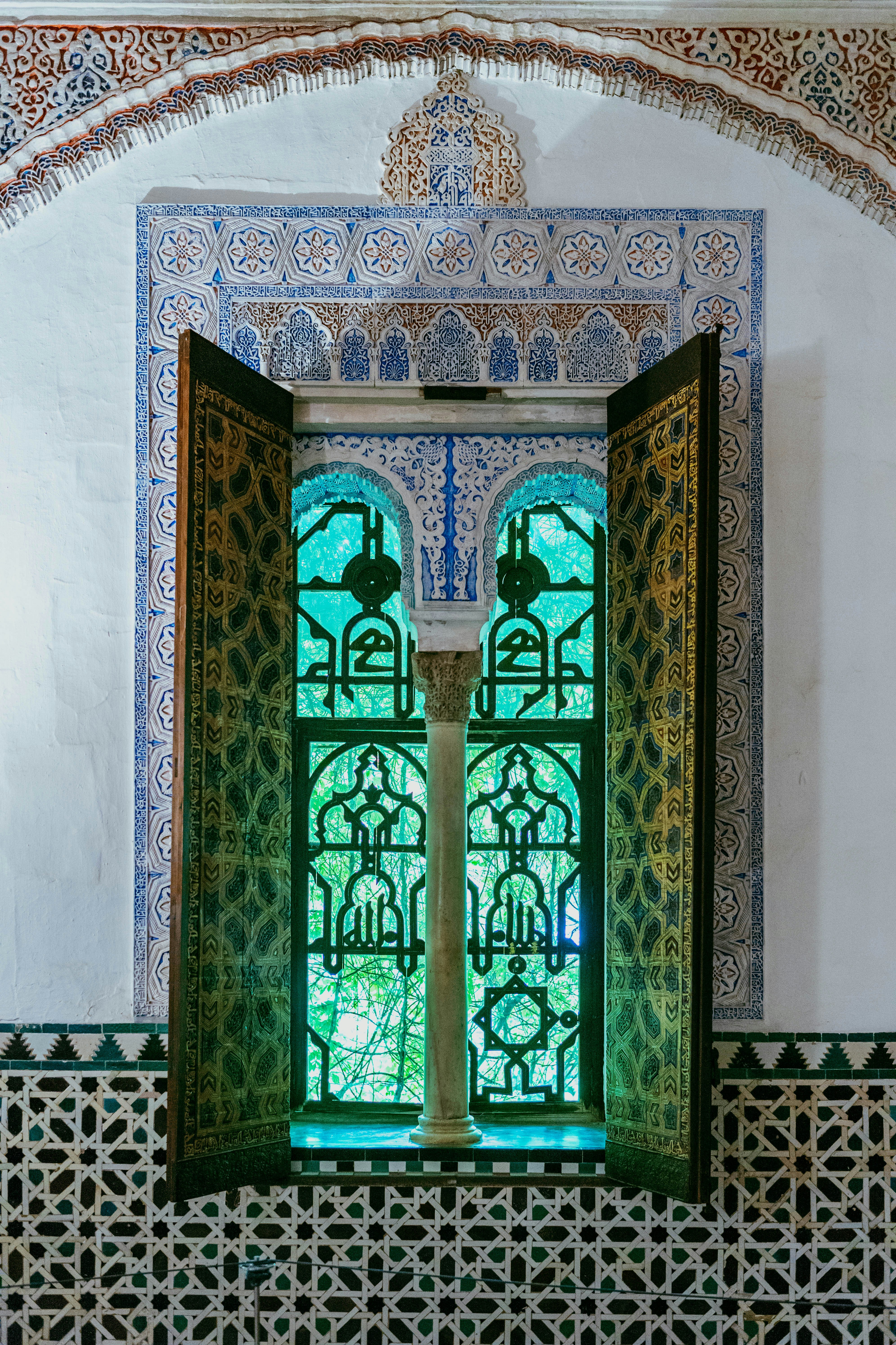 Emerald Gate: Green Light Through Ornate Doors