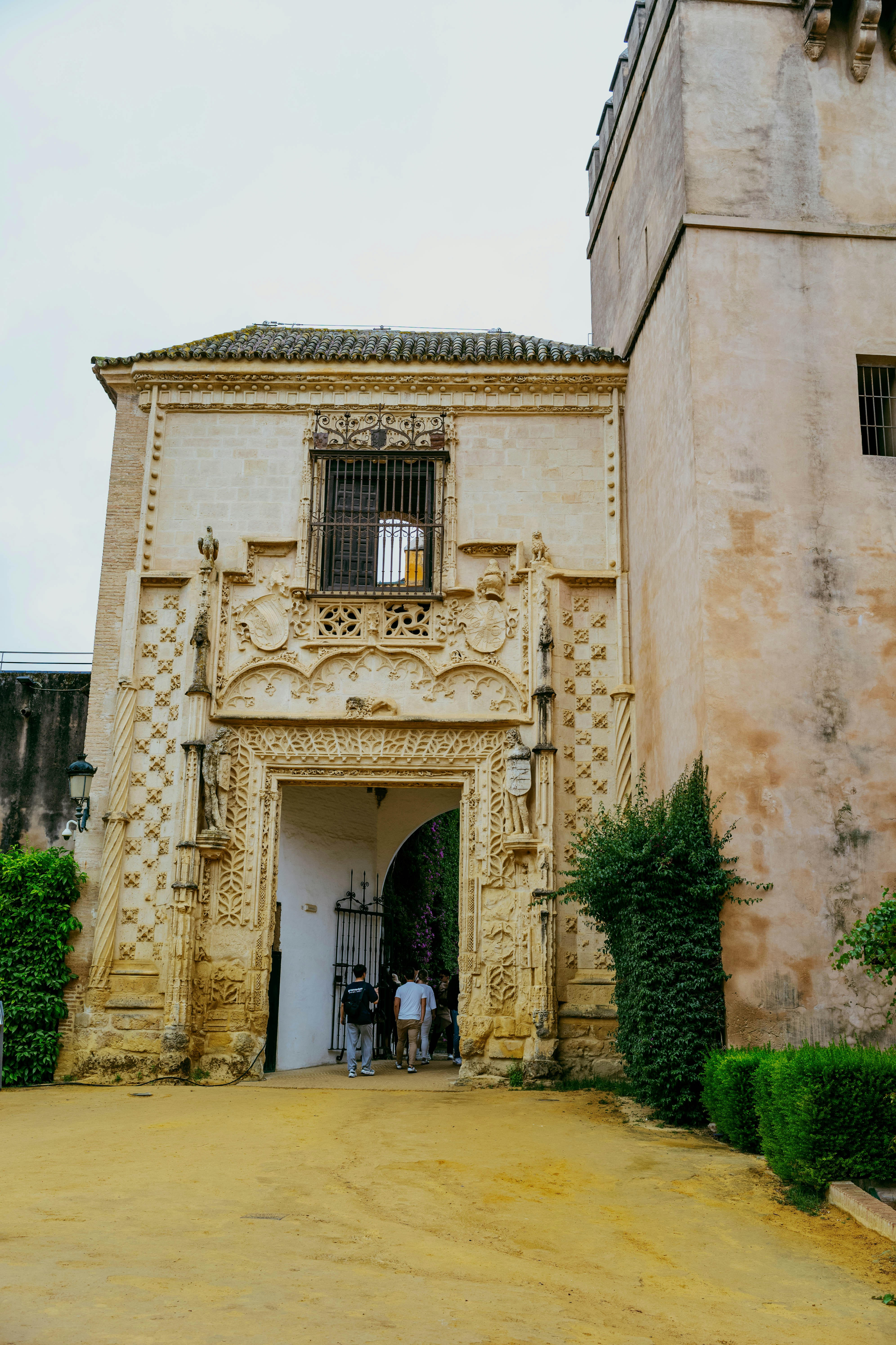 Ornate Archway Gateways a Sunlit Courtyard