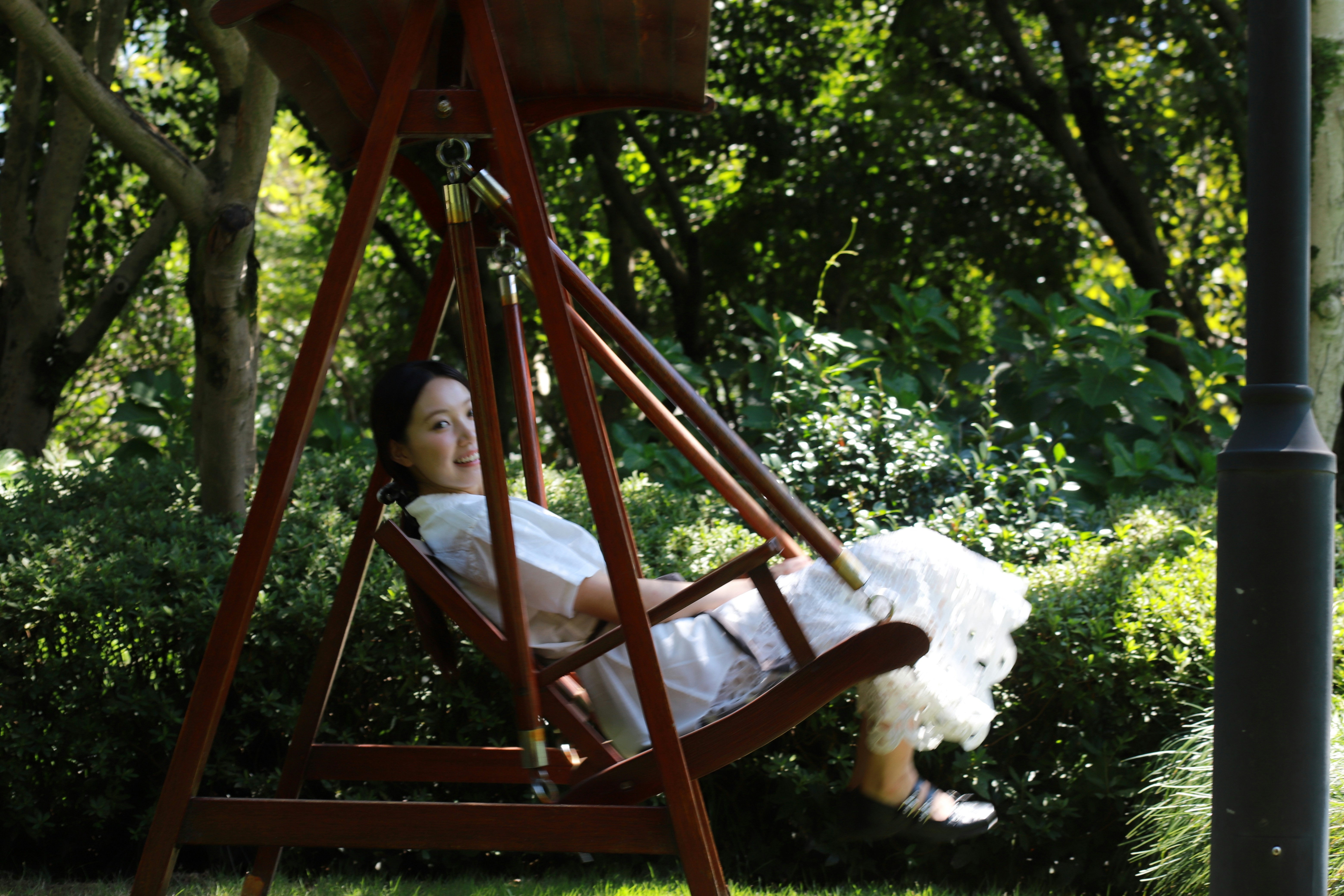 Swinging Portrait: A Quiet Moment in the Garden