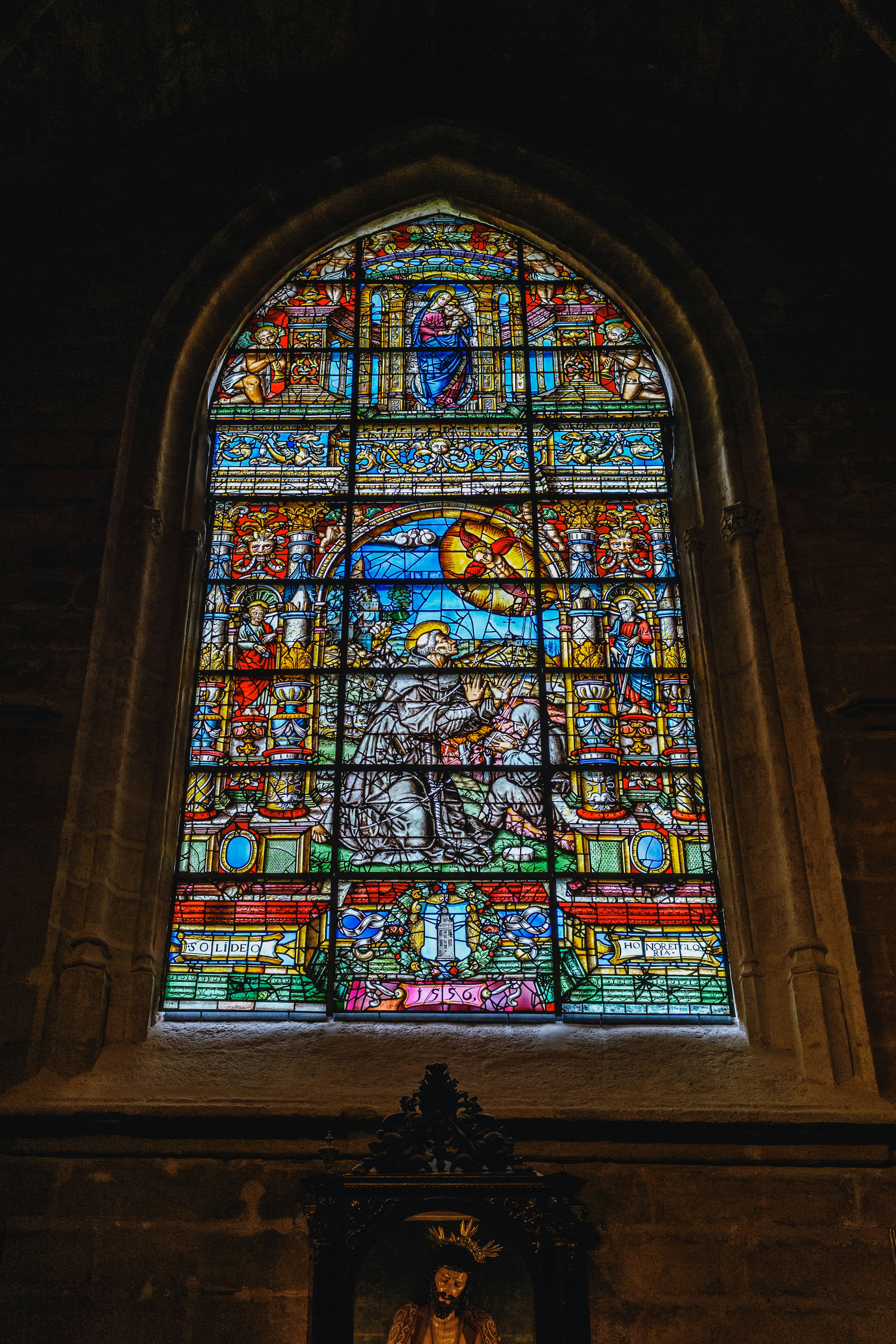 Stained Glass Reverie: A Southern Cathedral Window in Warm Light