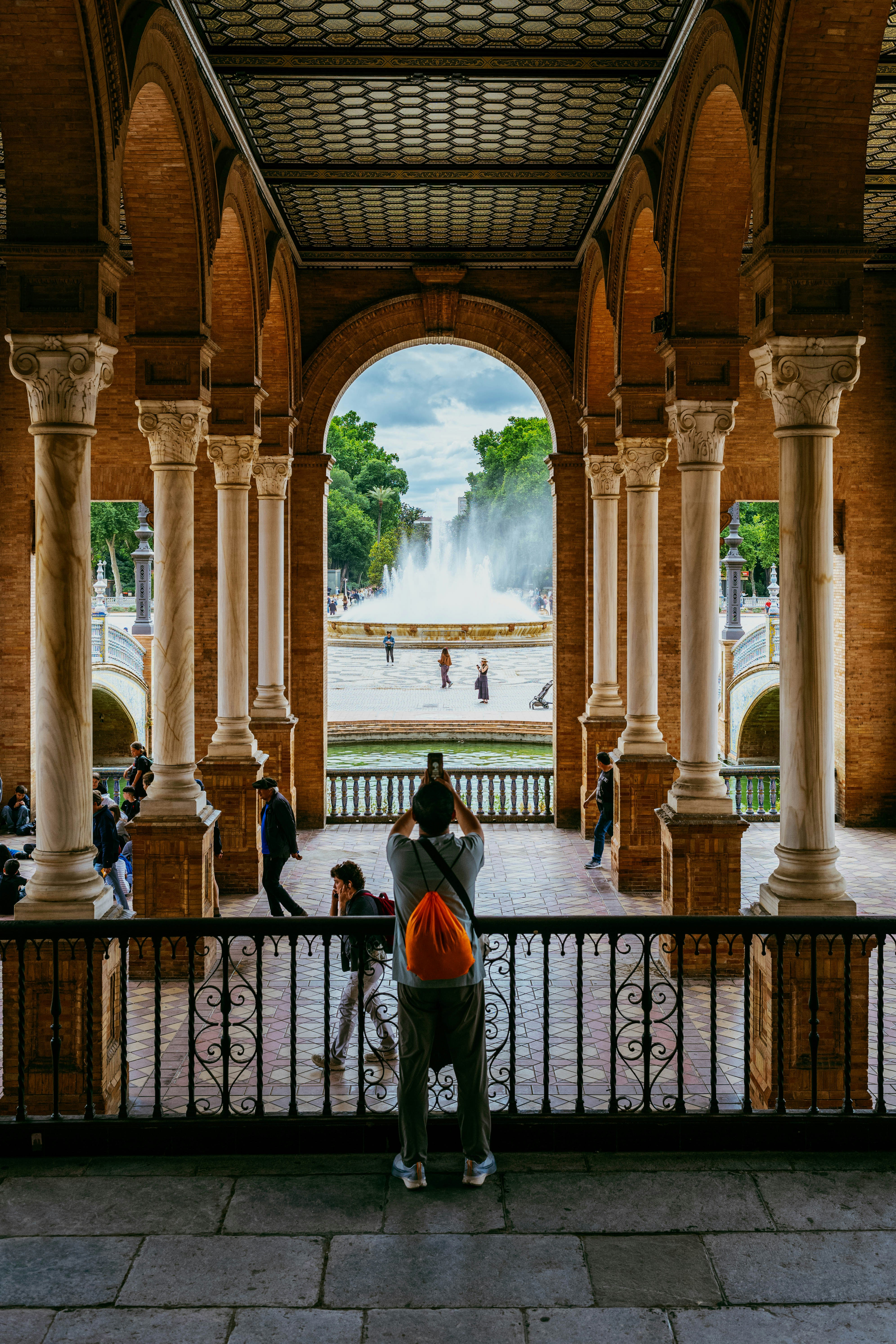Galeried Sonata: Portraitist at the Archway Overlooking the Fountain