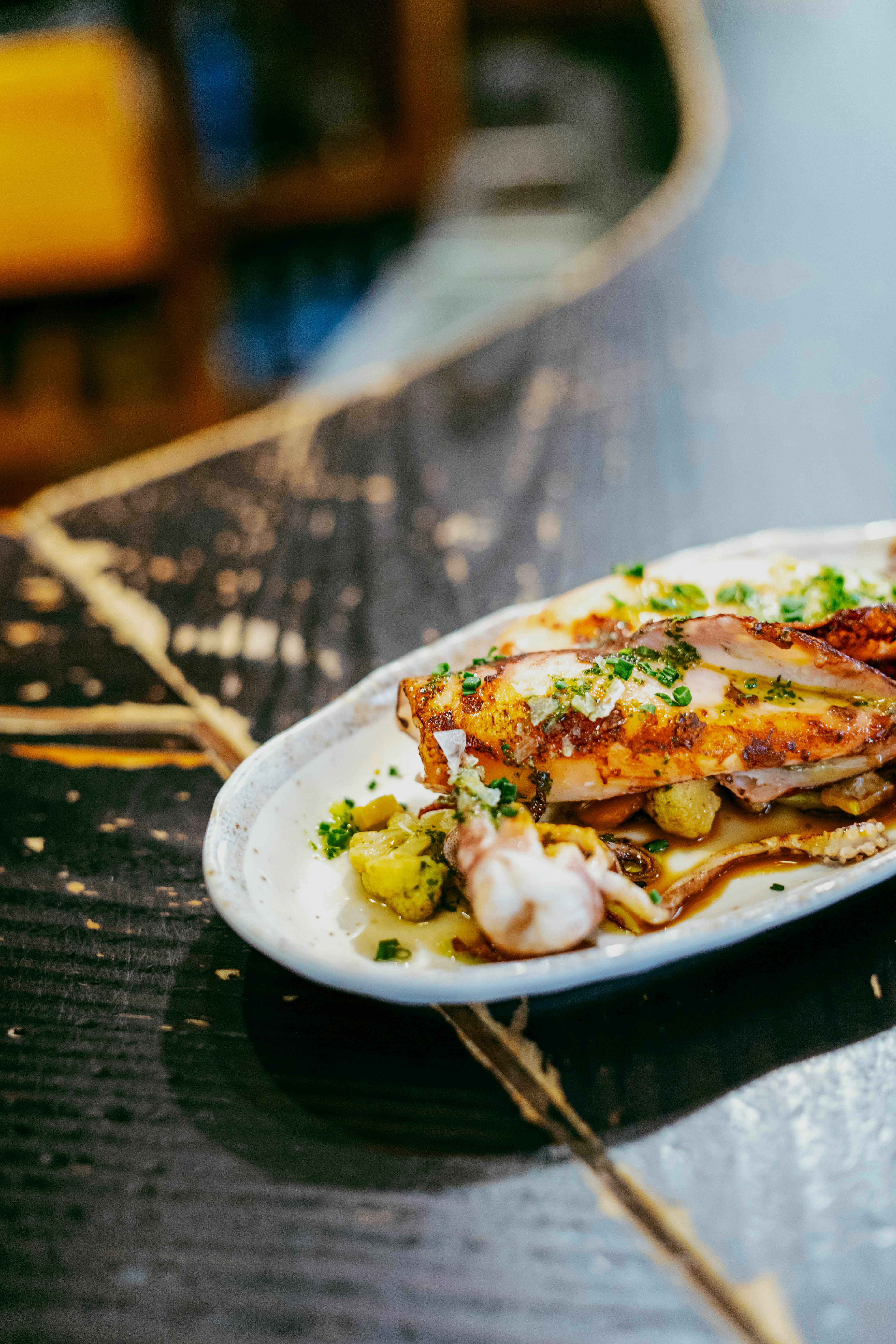 Charred Poultry on a Rustic Platter: Golden Crust meets Garden Garnish
