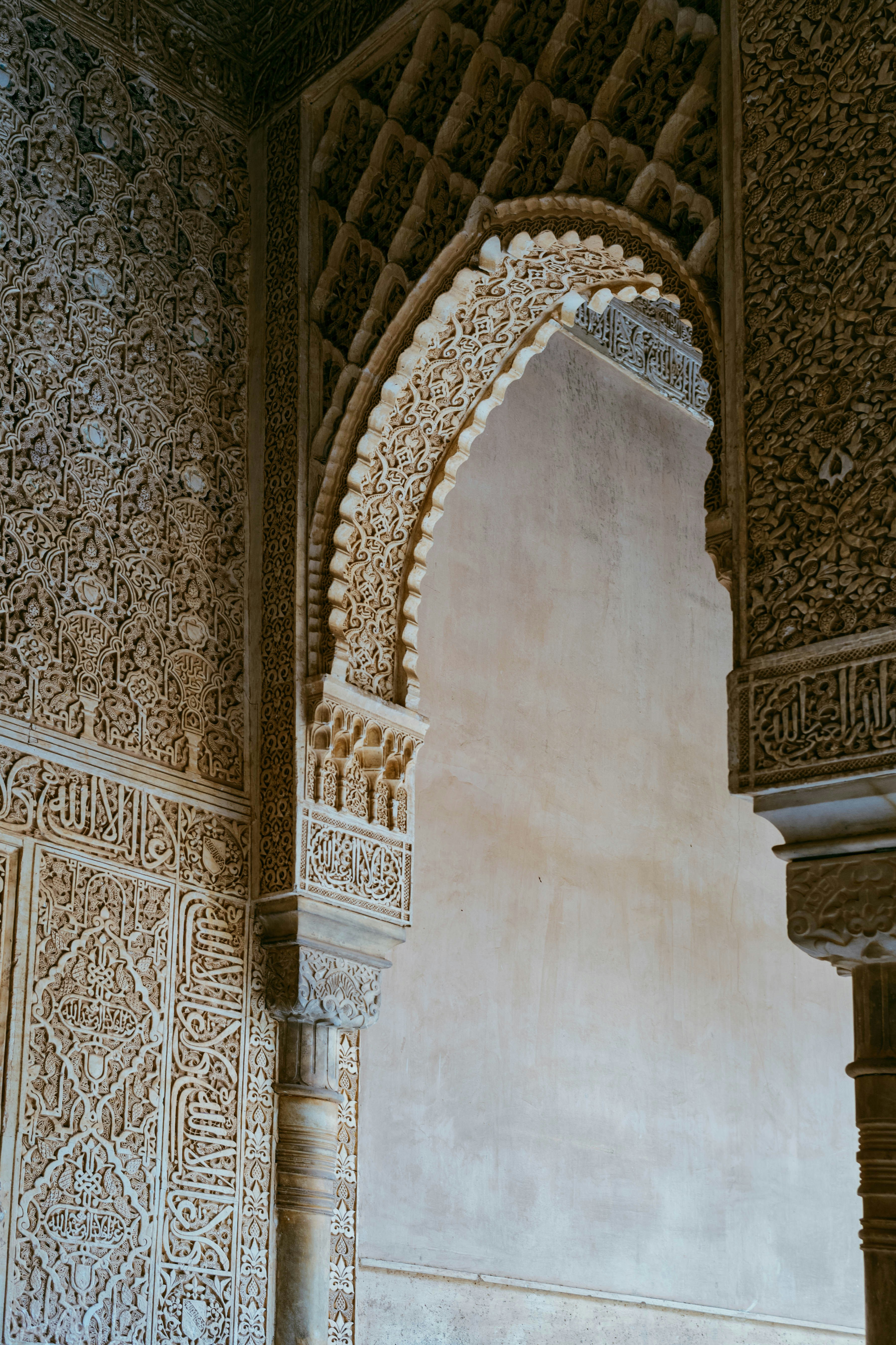 Arched Ornamentation: A Ladle of Light on Intricate Carved Stone
