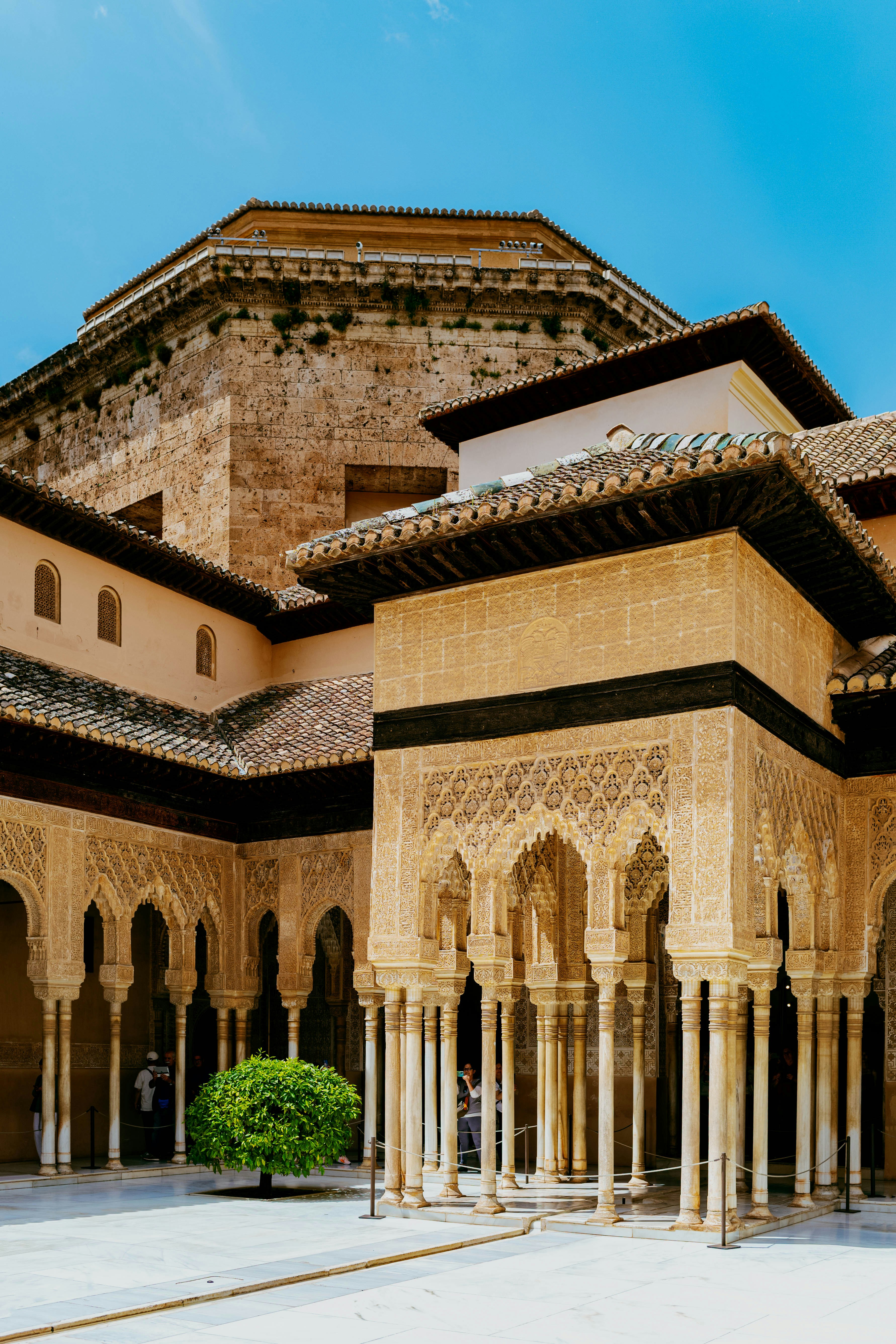 Ornate arches and sunlit courtyard of a historic fortress