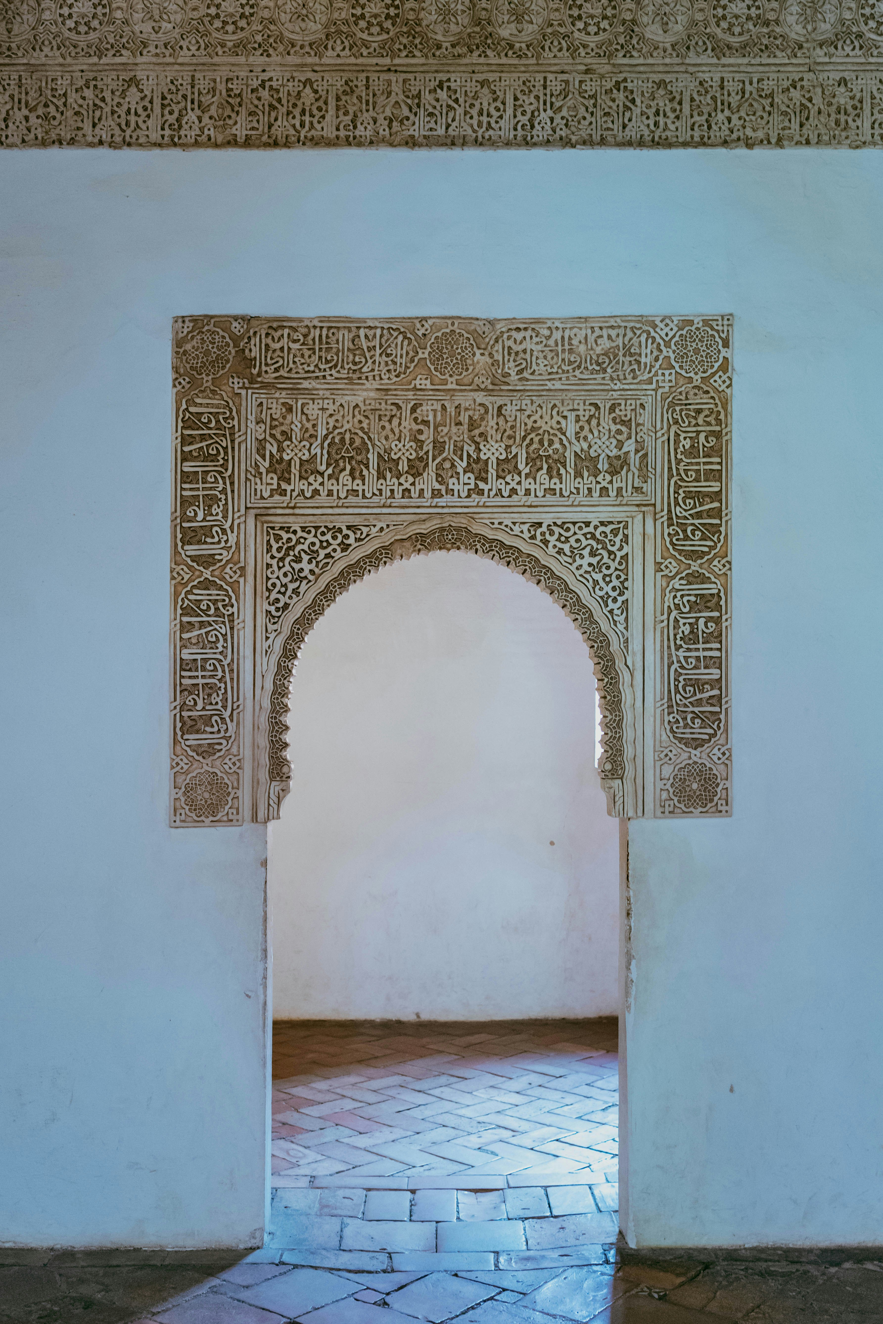 Archway of Intricate Carvings: A Portal into Quiet Geometry