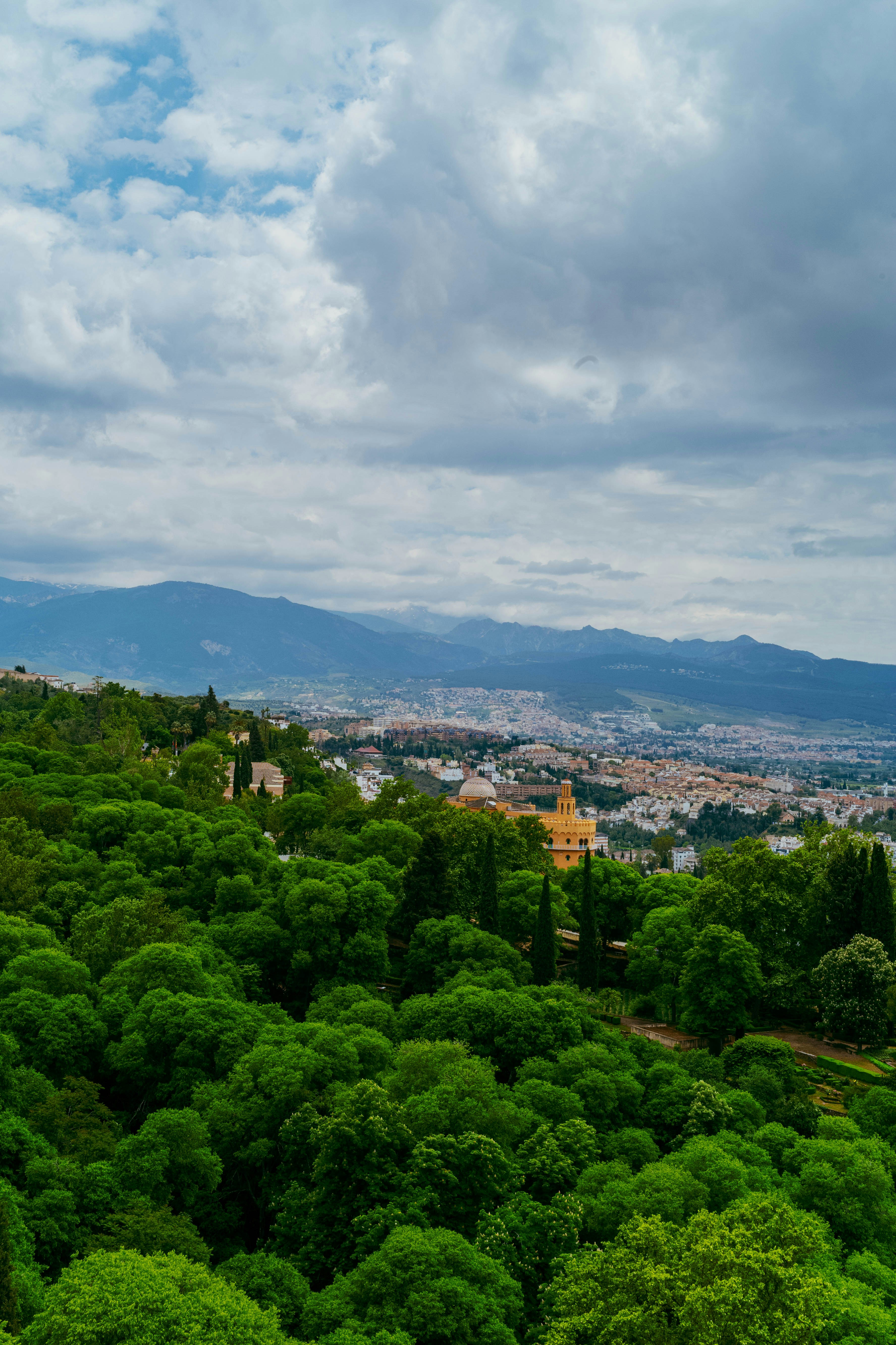 Verdant Hills Over a Quiet City