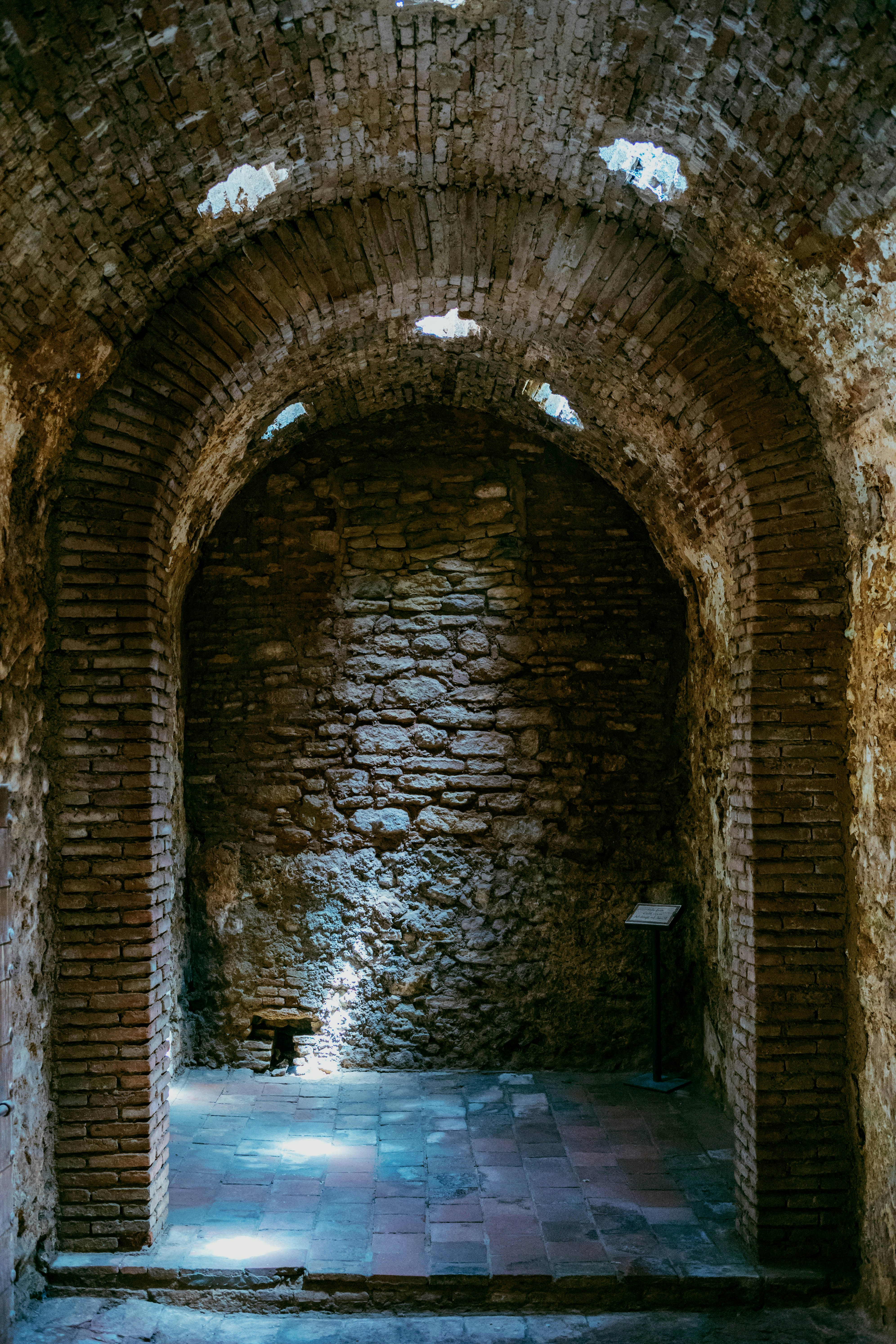 Through the Ruined Arch: A Quiet Interlude in Stone Light