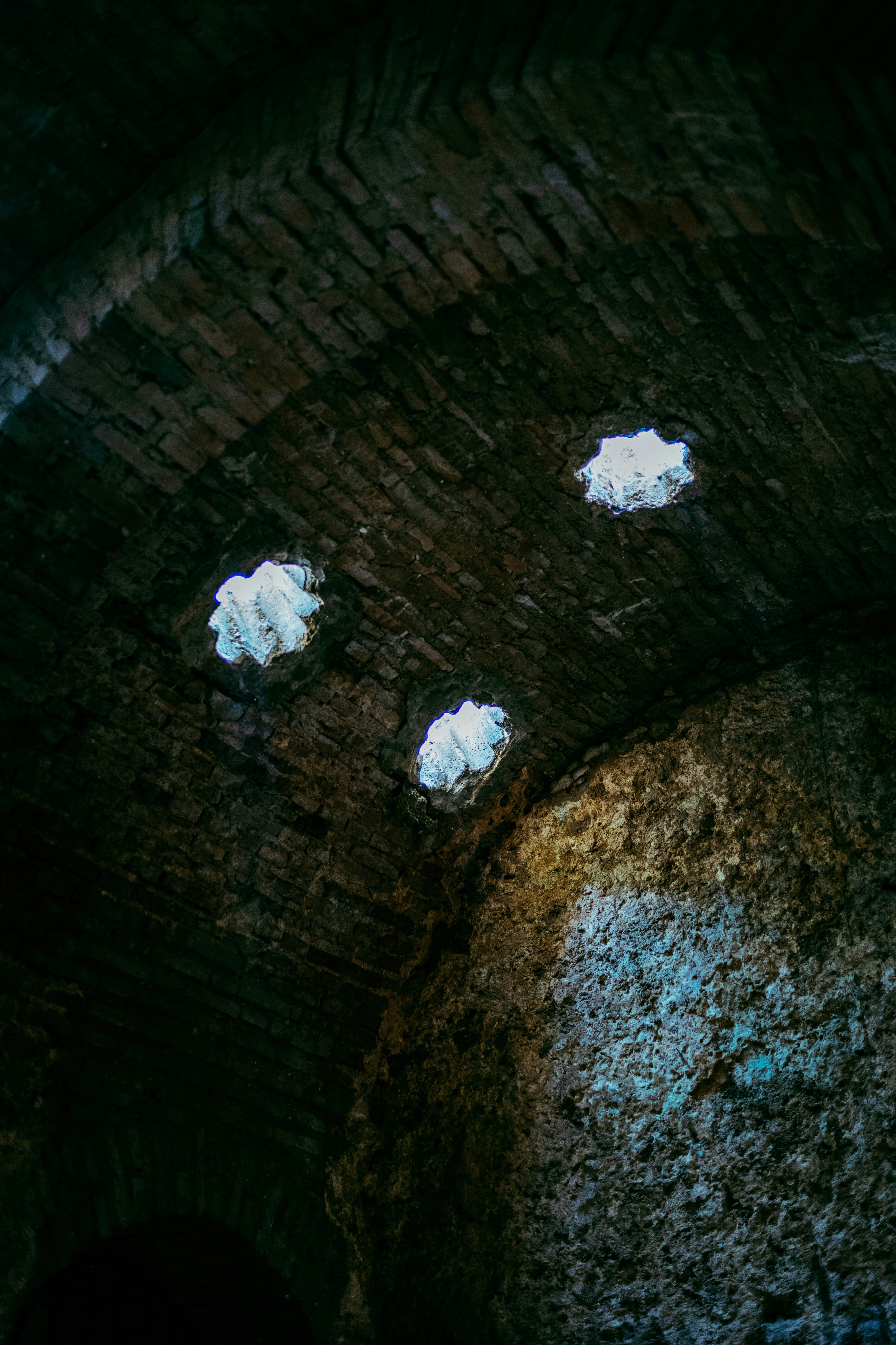 Sky Holes in an Ancient Brick Vault