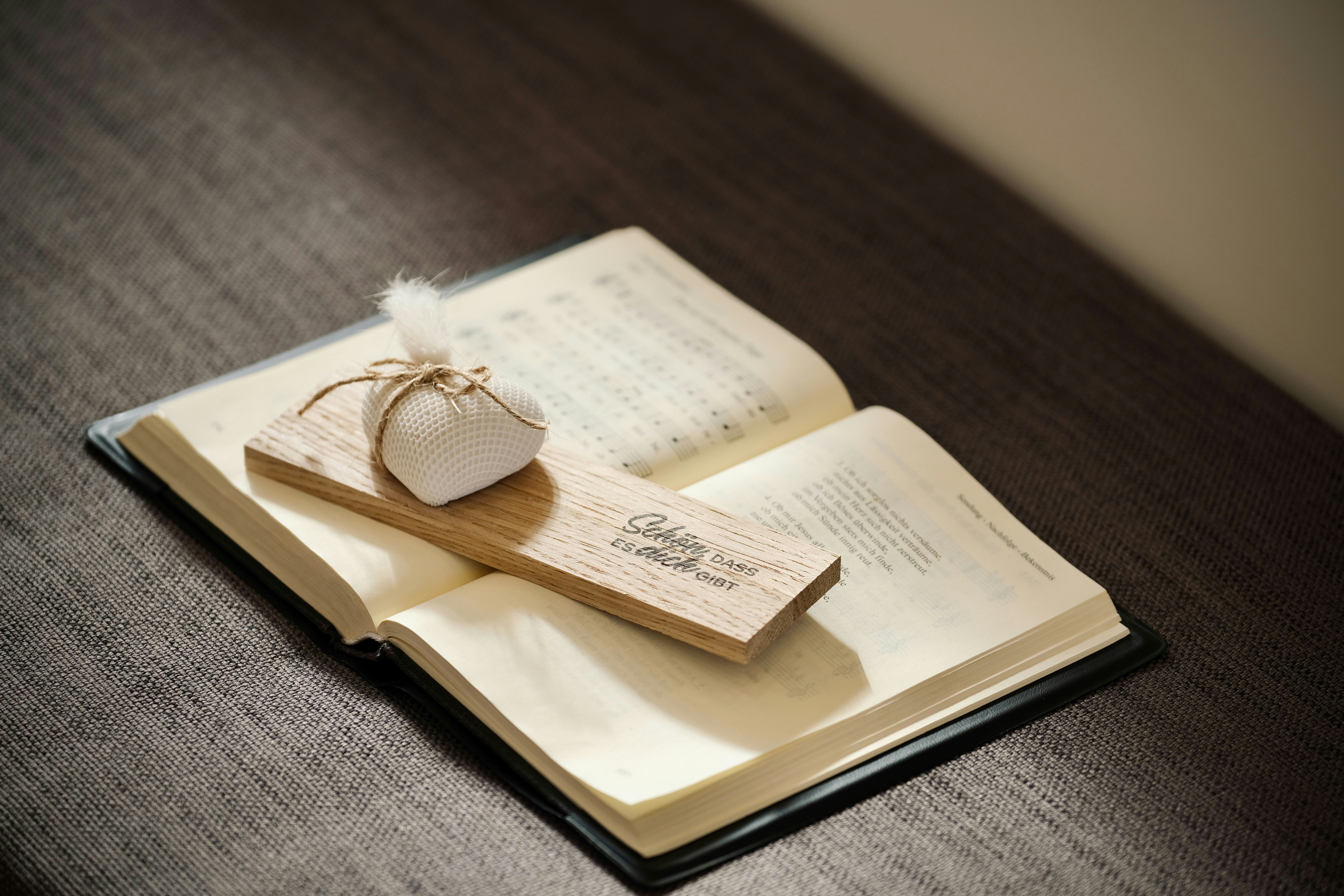 Open Pages, Small Wrapped Gift: A Quiet Desk Moment
