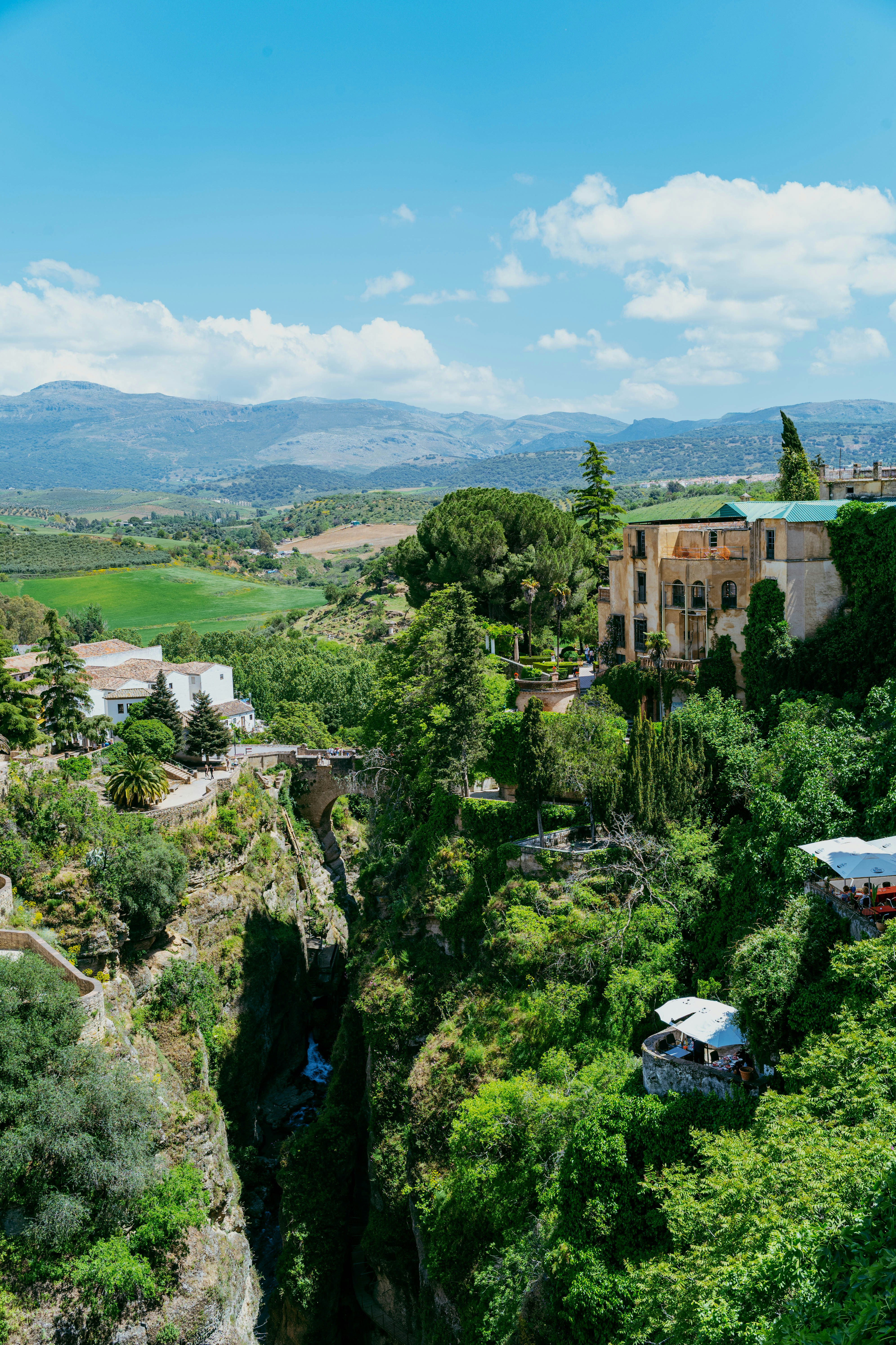 Clifftop Village Amid Terraced Valleys
