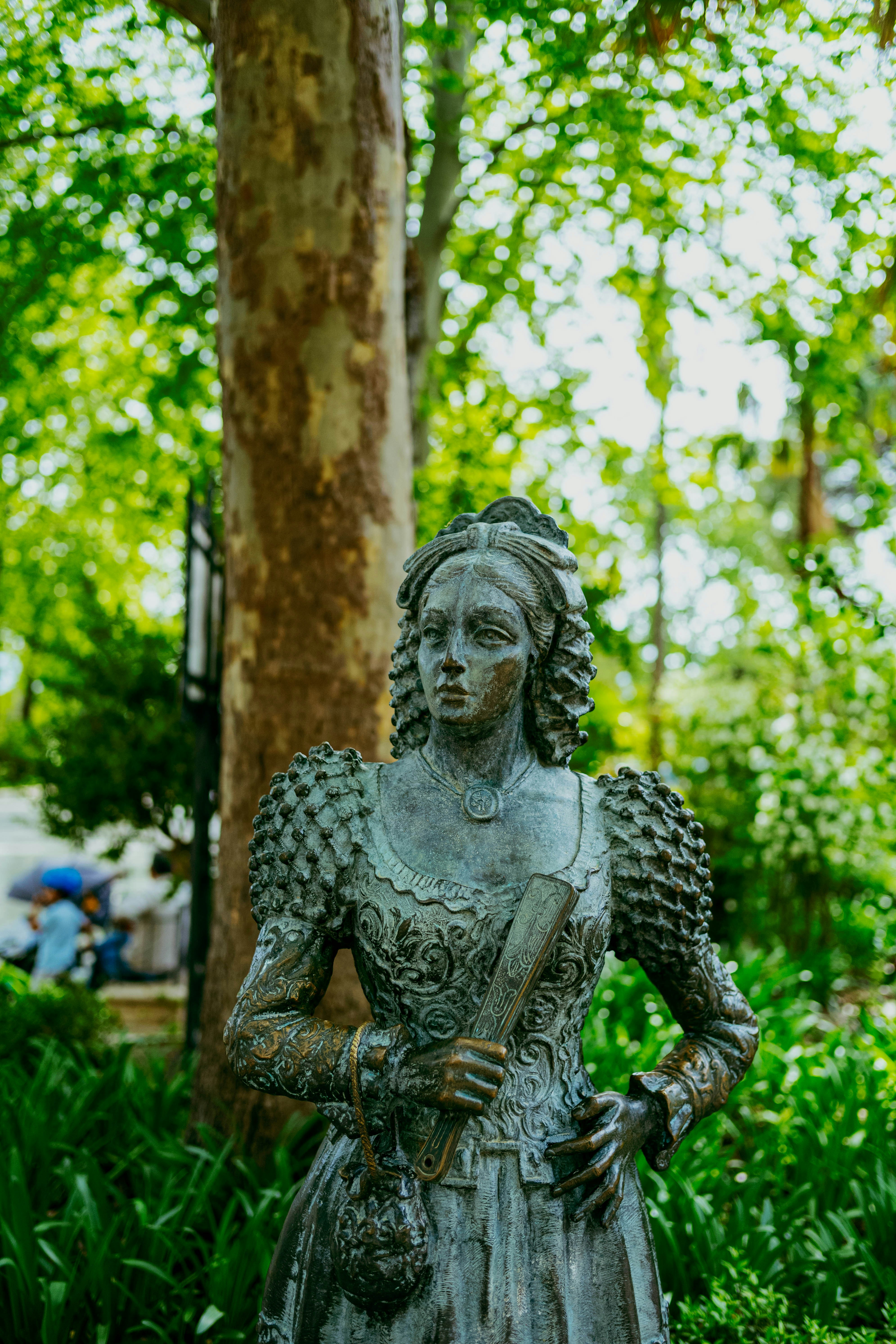 Stone Warrior in a Sunlit Garden