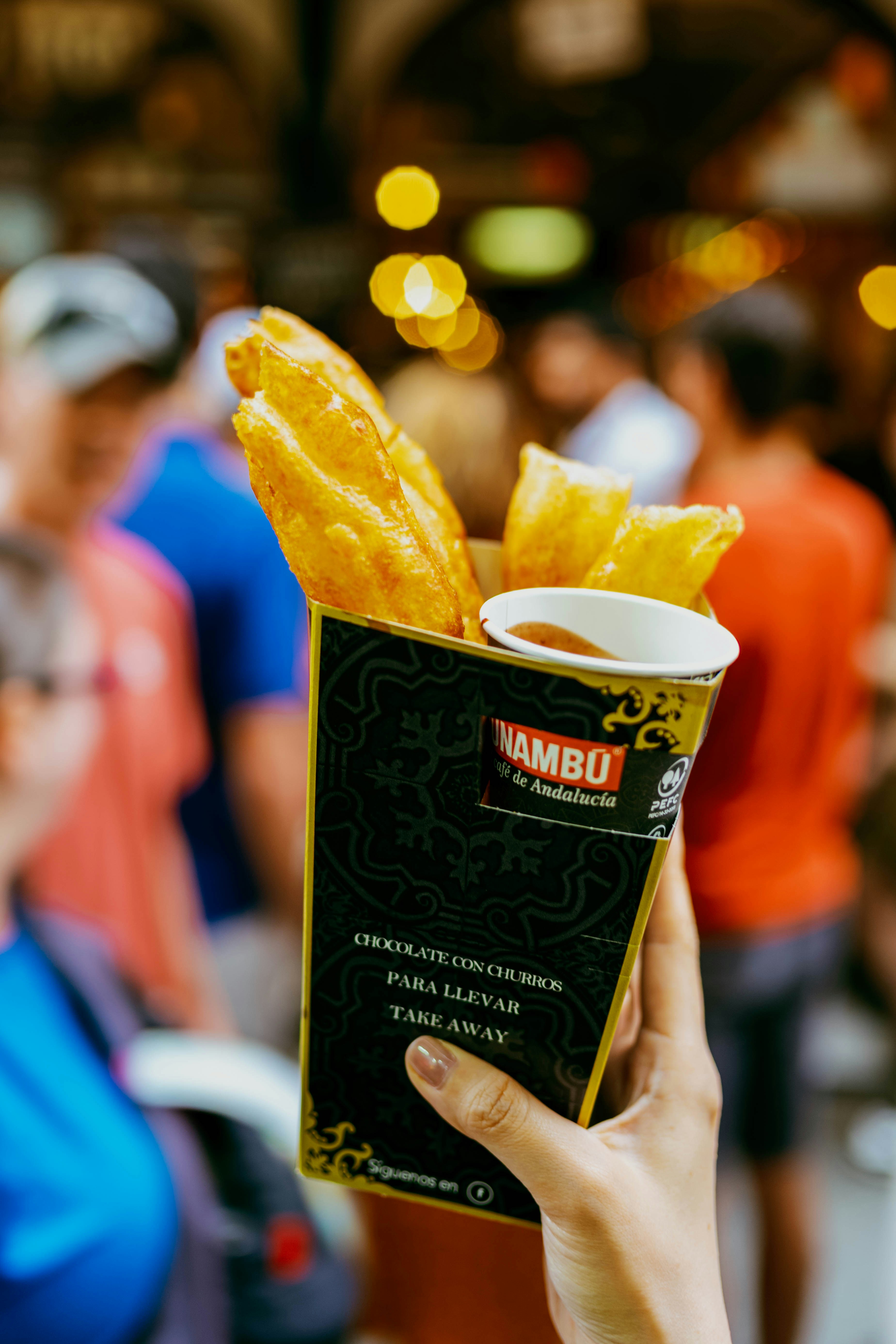 Crisped Elation: A Handful of Churros Framed by a Chocolate Box