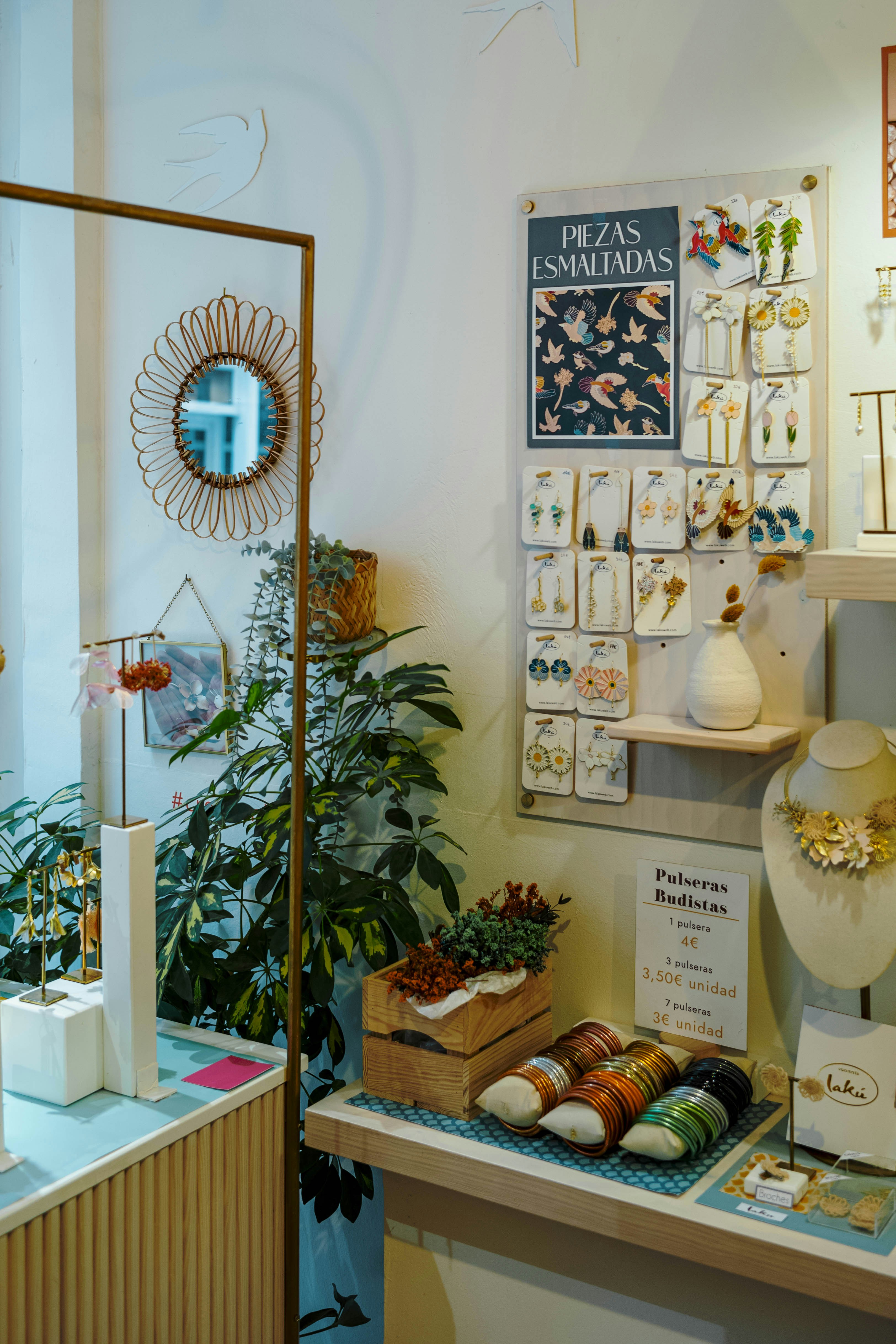 Boutique Display: Jewelry and Greenery in a Sunny Studio