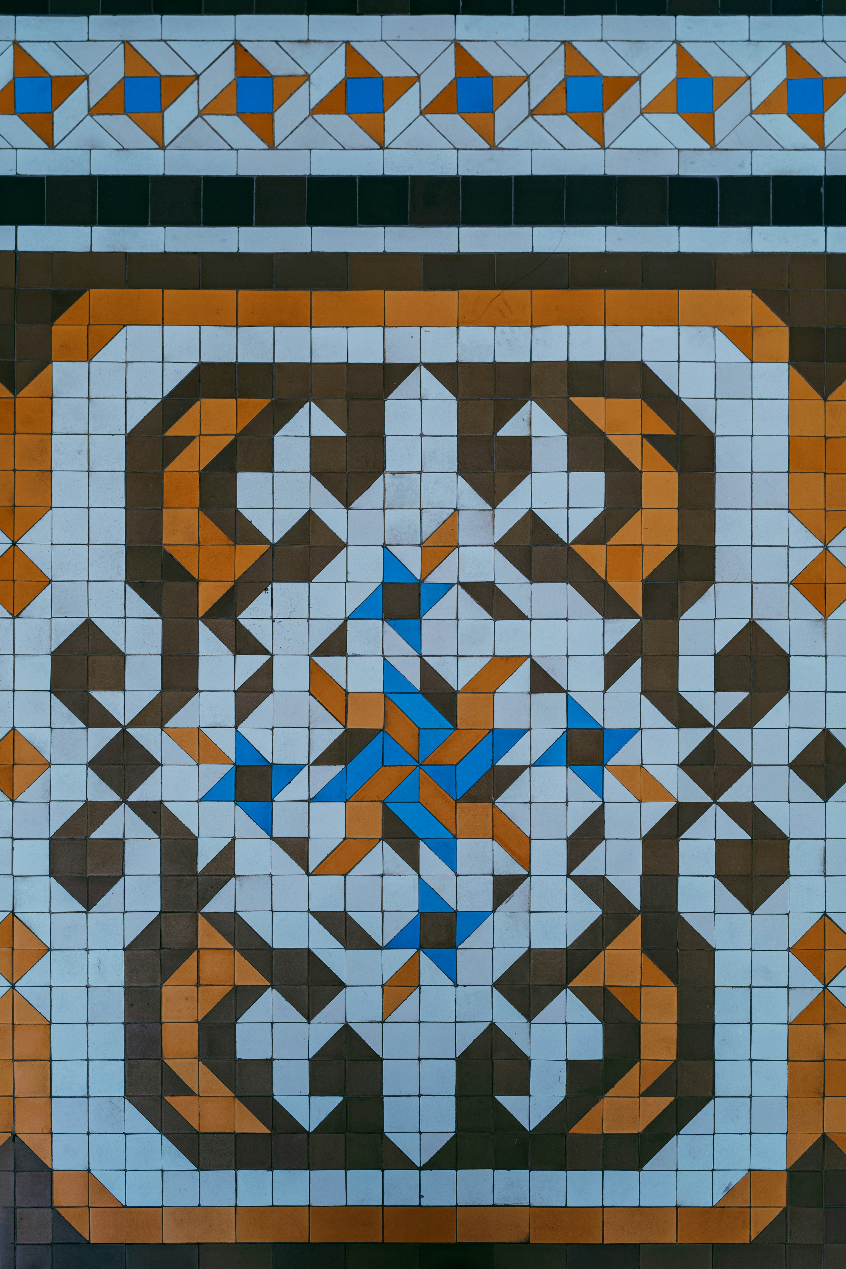Geometric Mosaic: Symmetry and Color Spin Across Tiles