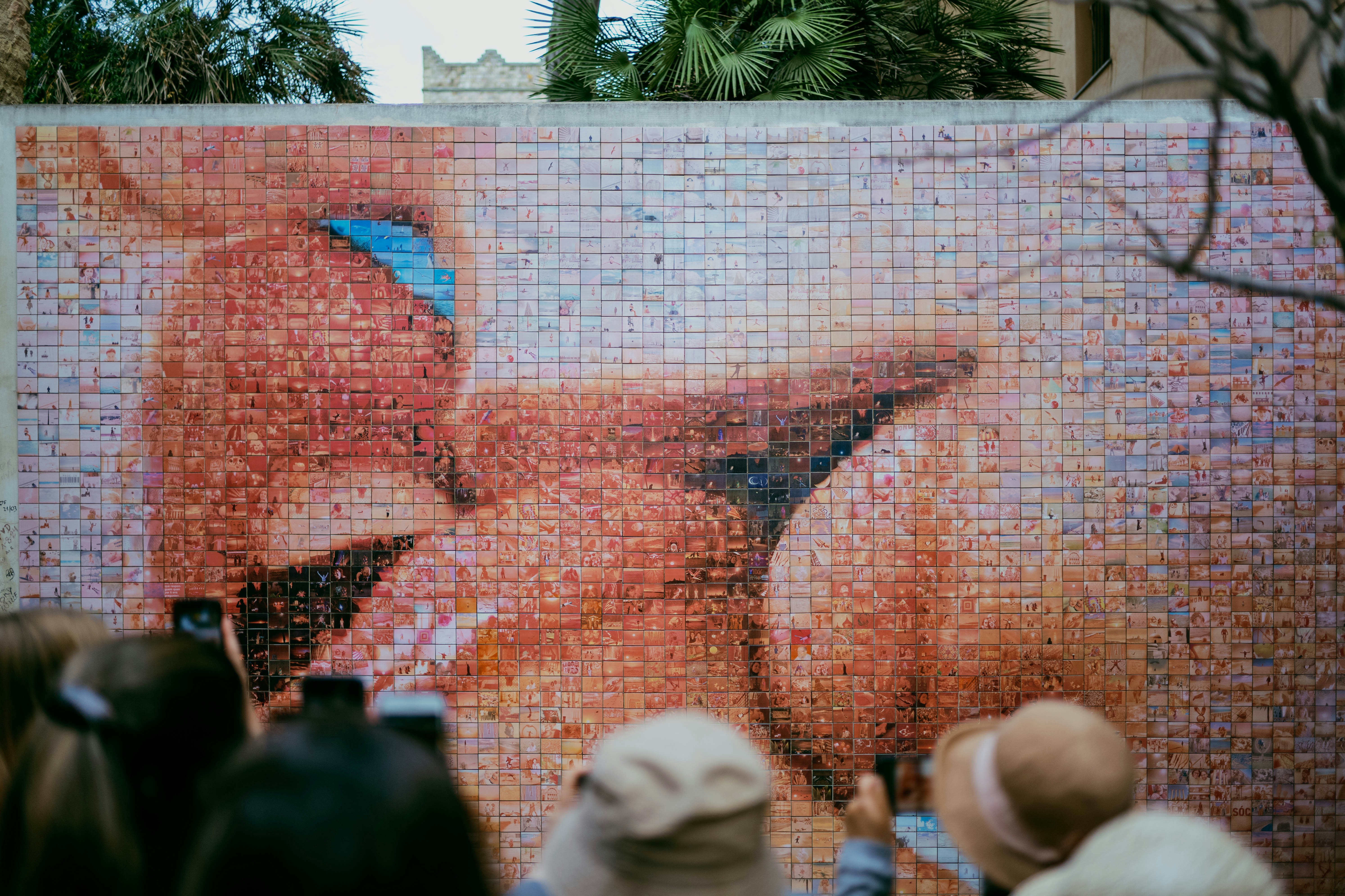 Mosaic Embrace: A Public Art Moment Framed by an Audience