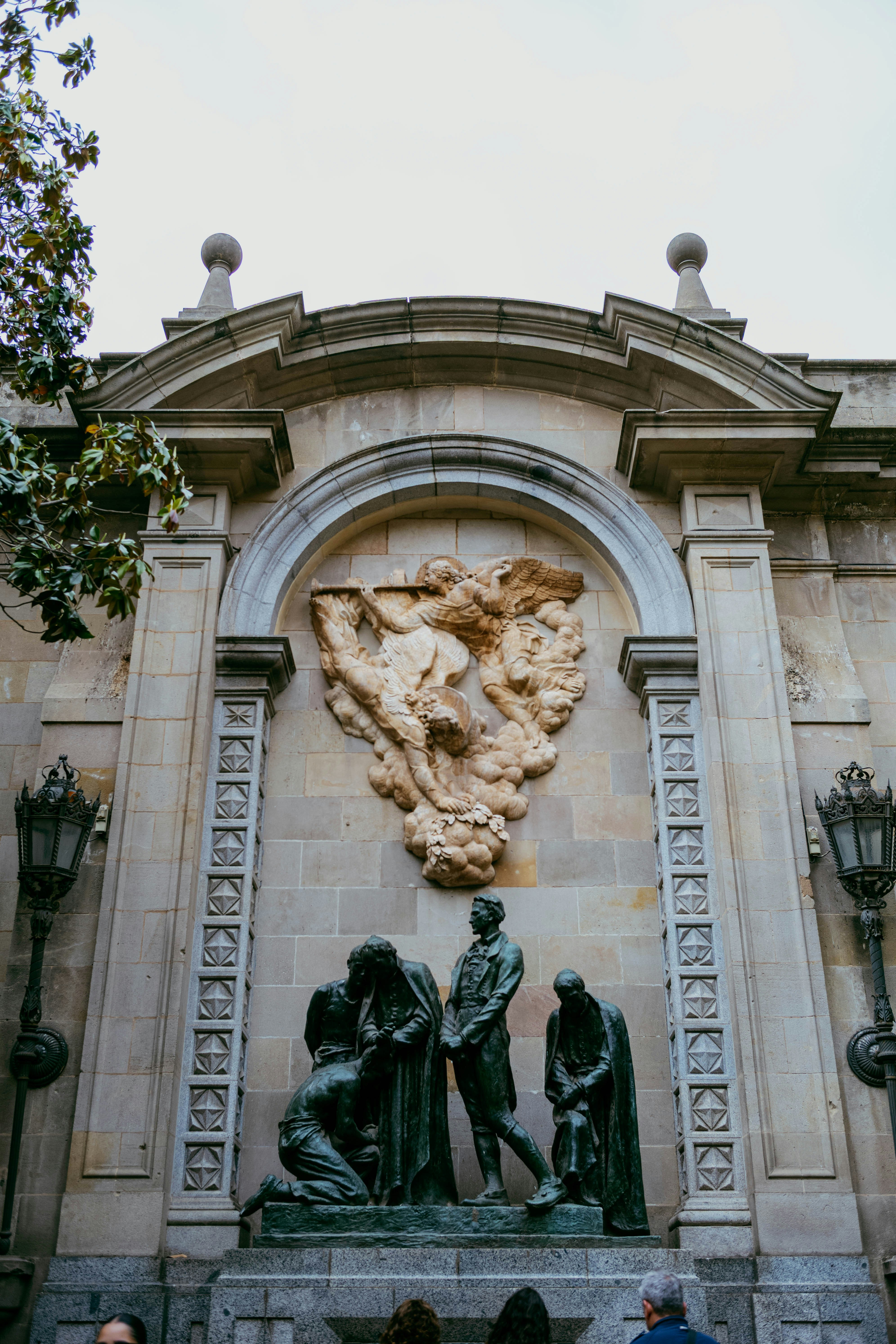 Tales of Stone and Sky: A Monumental Facade with Sculpted Heroism