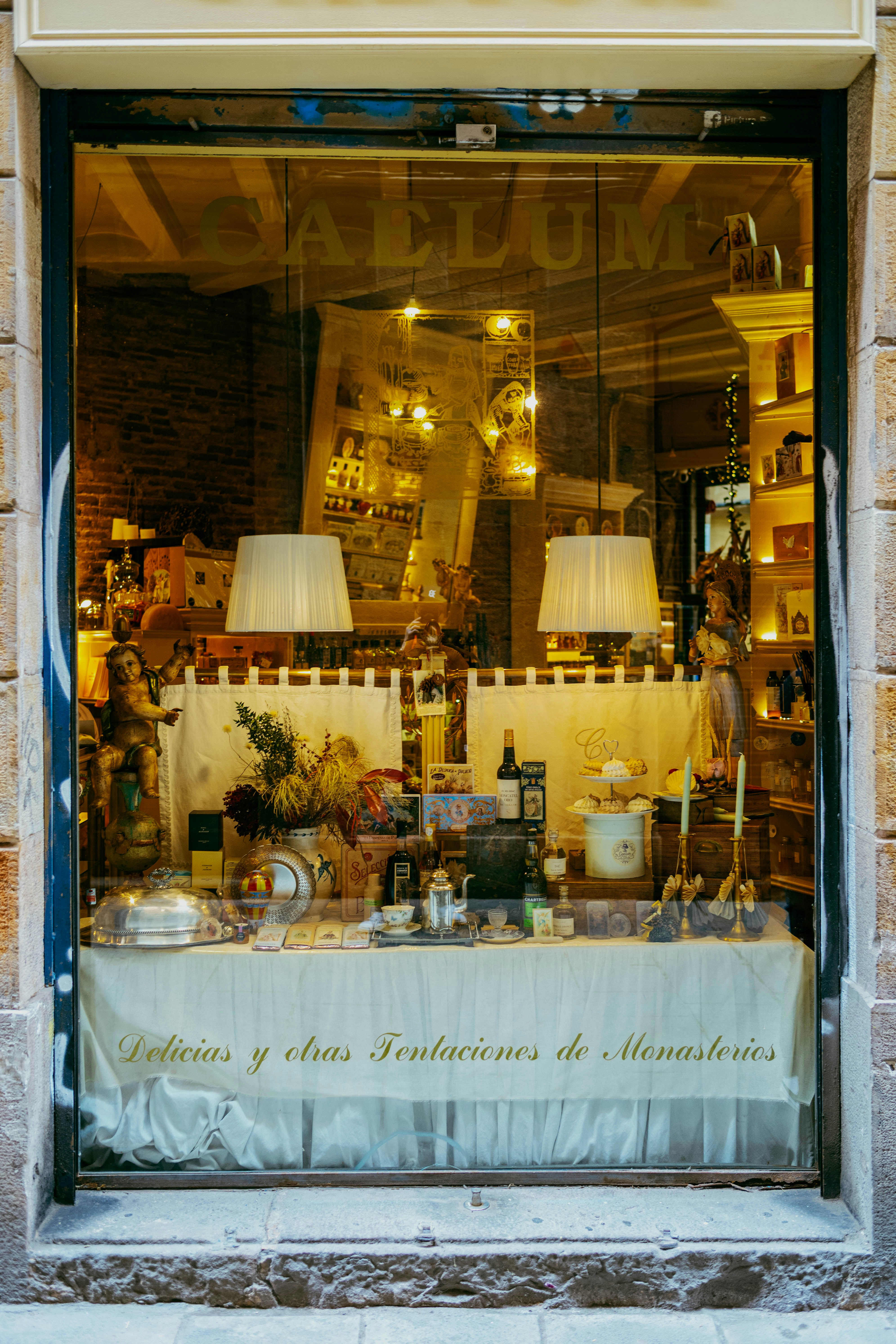 Warm Shop Window Still Life: Candles, Bottles and Blown Glass