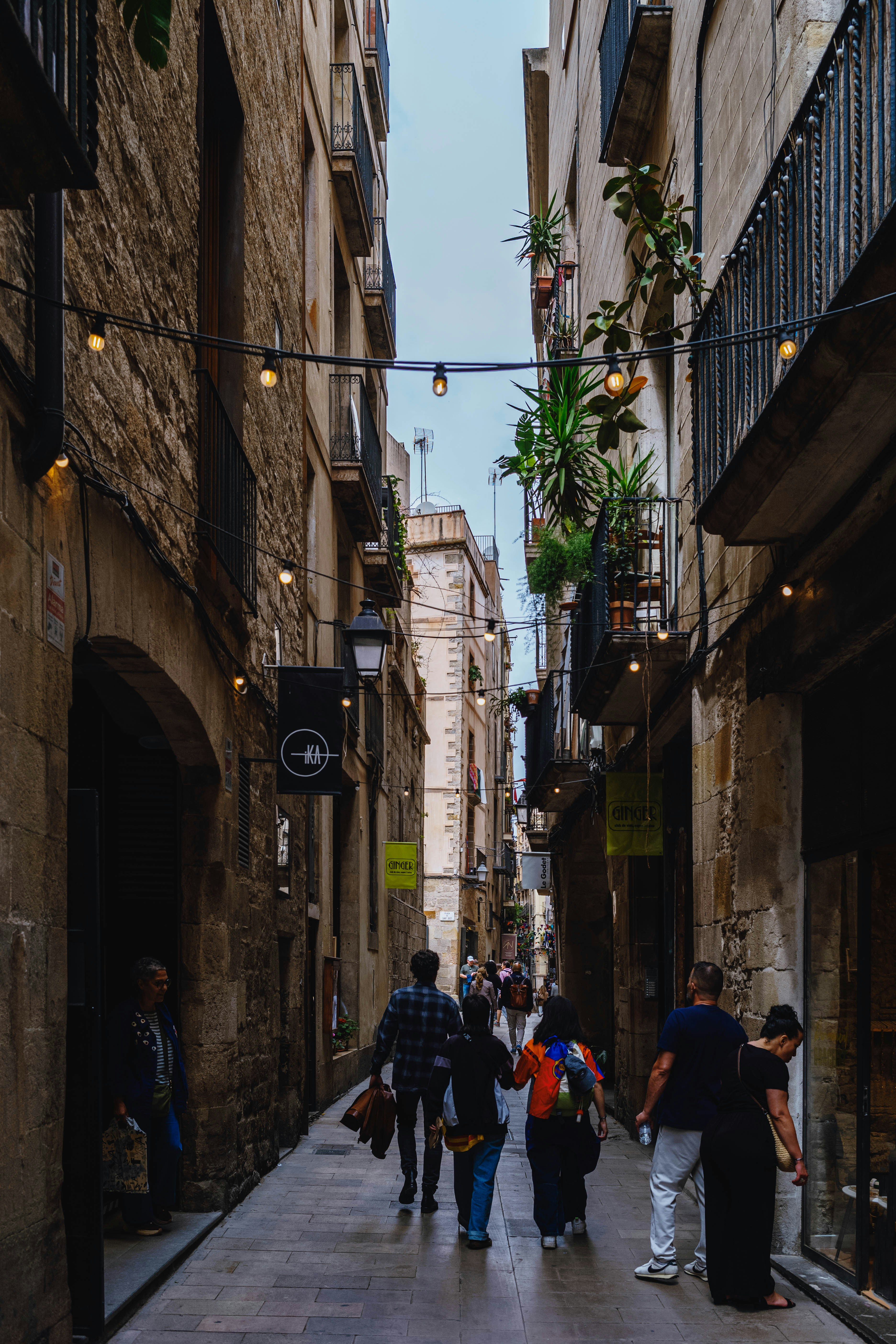 Lanterns Over a Narrow European Alley