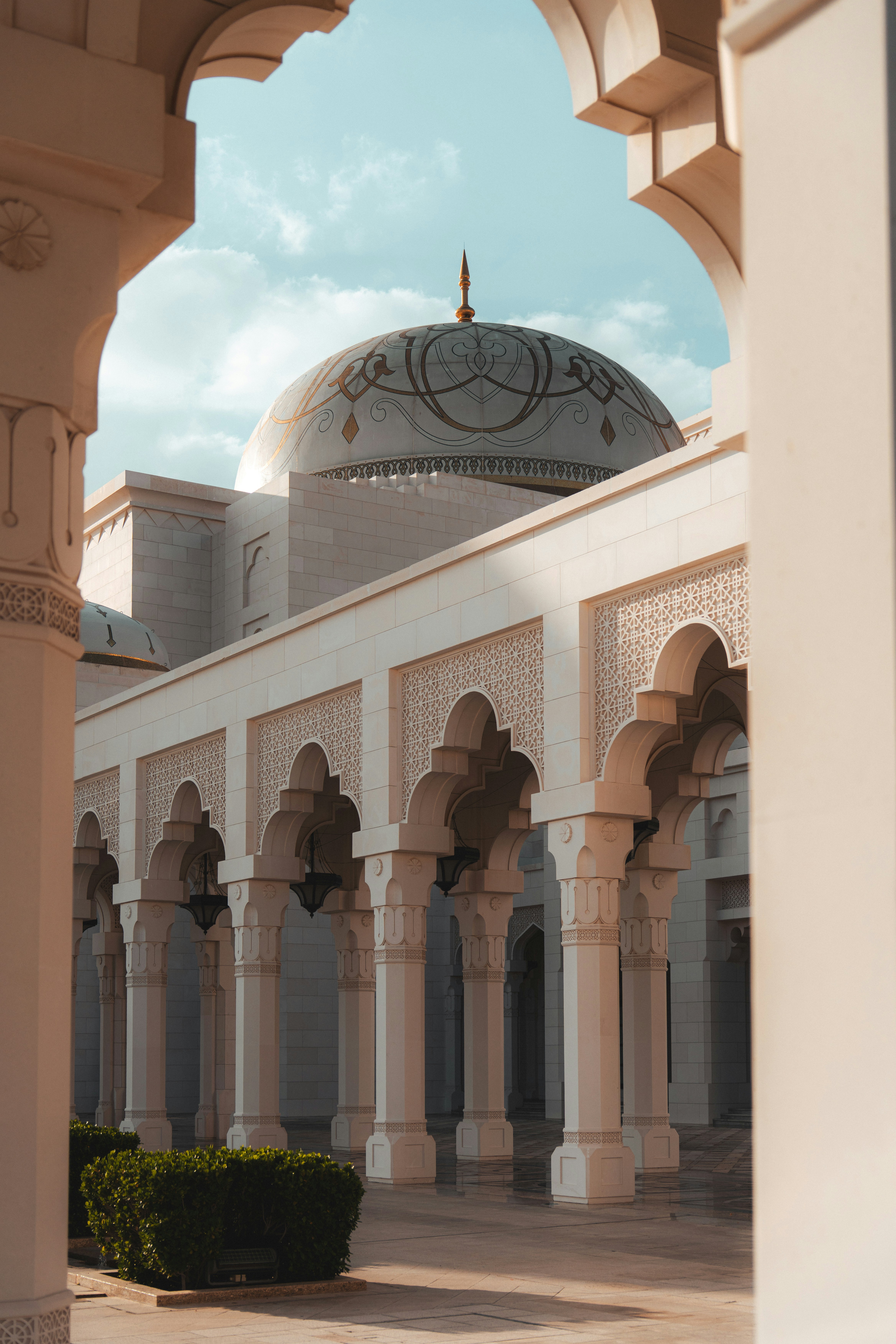 Dome Over Courtyard Arches: Echoes of Light in Petra-Style Architecture