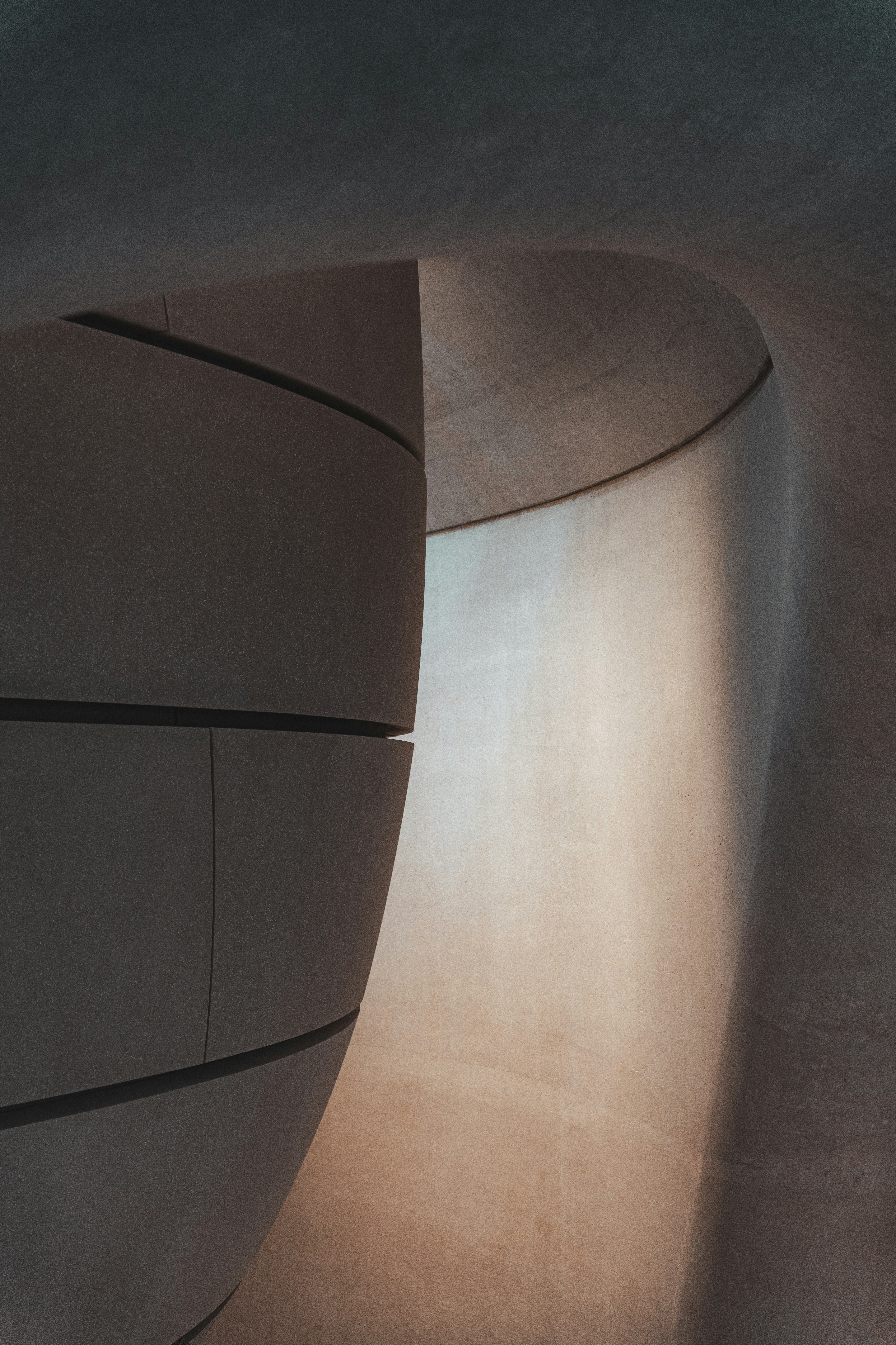 Curved Concrete: The Interplay of Light and Segmented Form