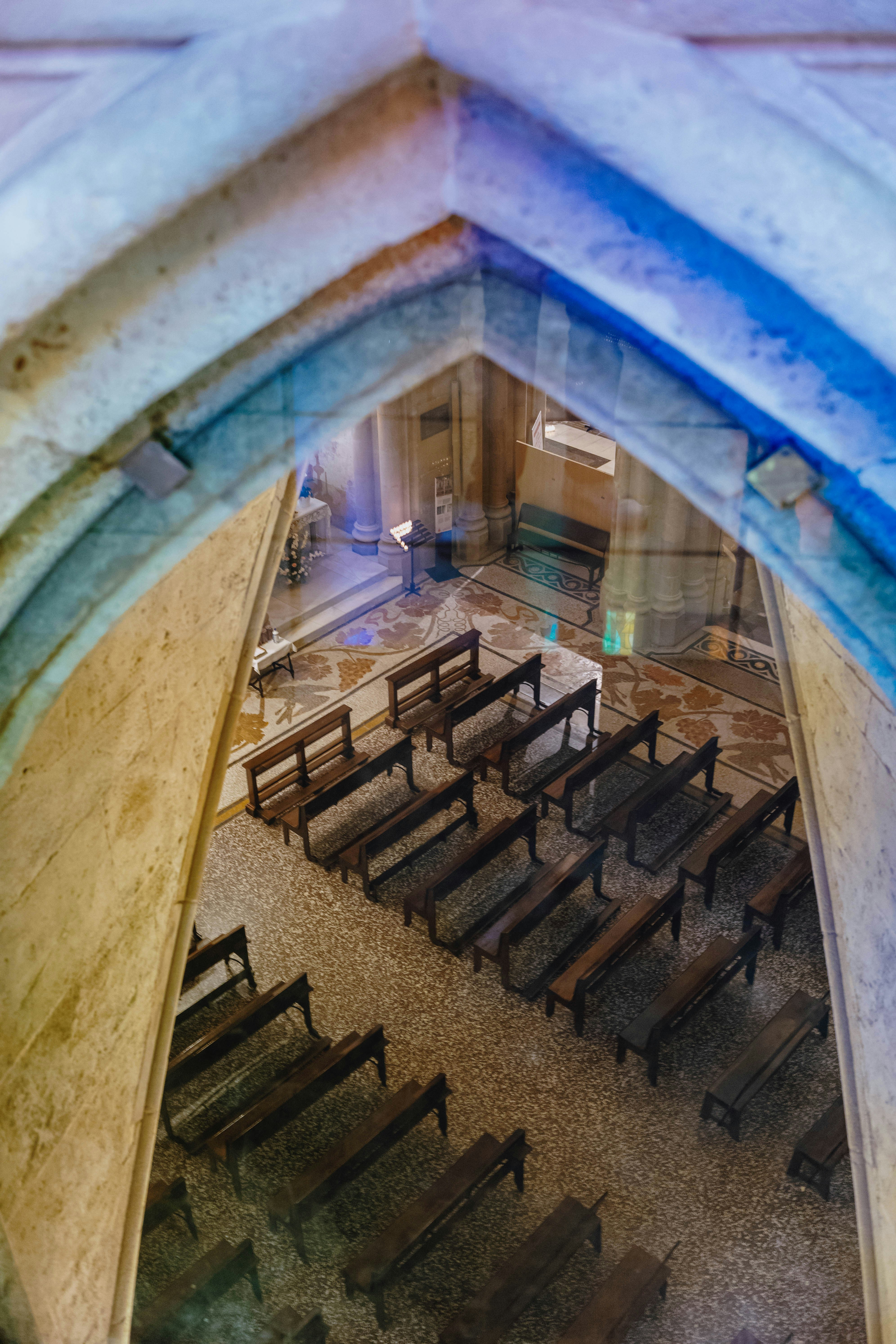 Stained-Archway Chapel Aisle from a Bird’s-Eye Perspective