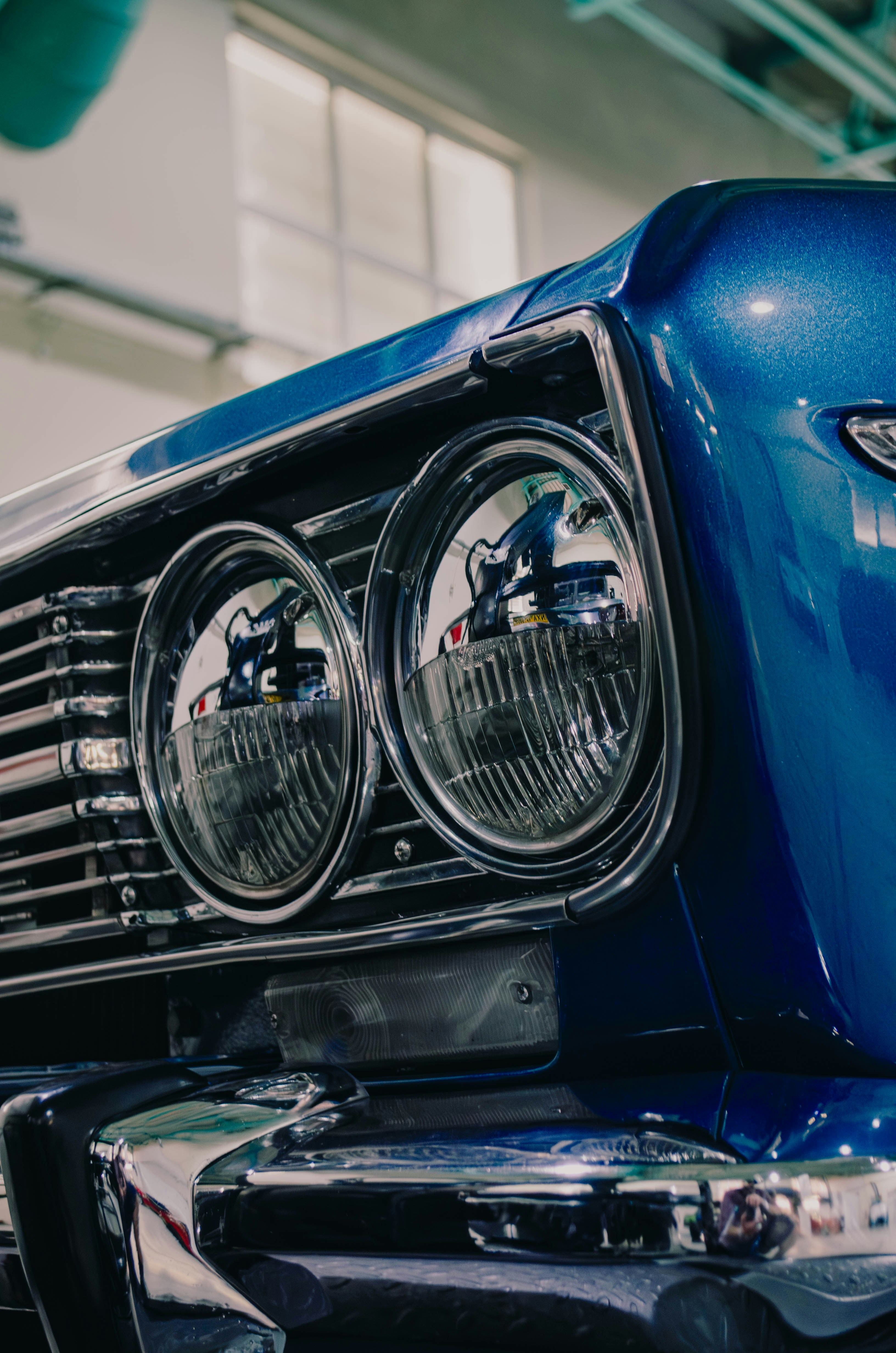 Chrome and Curves: A Close Peek at the Blue Chrome Grille