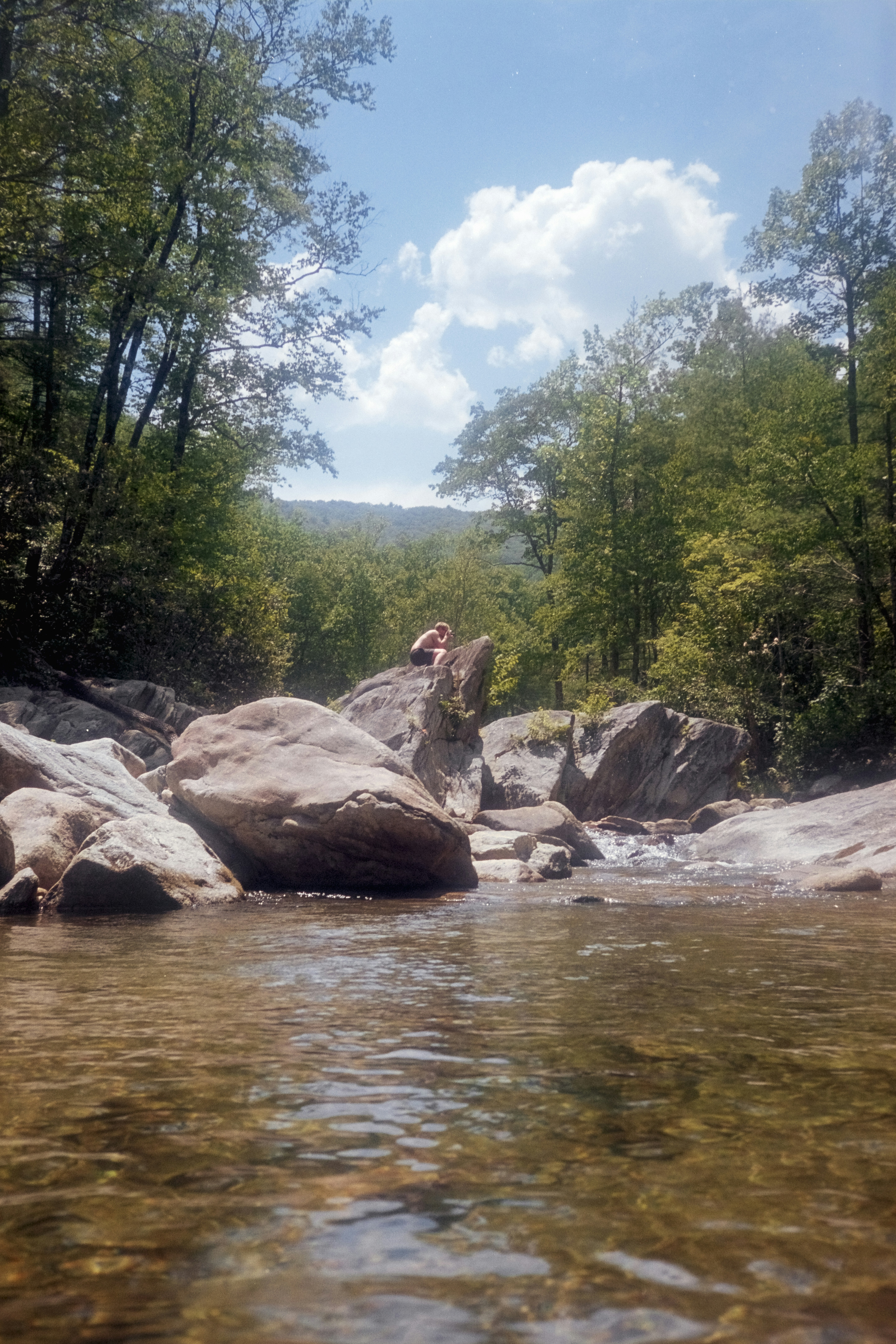 Rugged Riverbank Break into Sunlit Sky