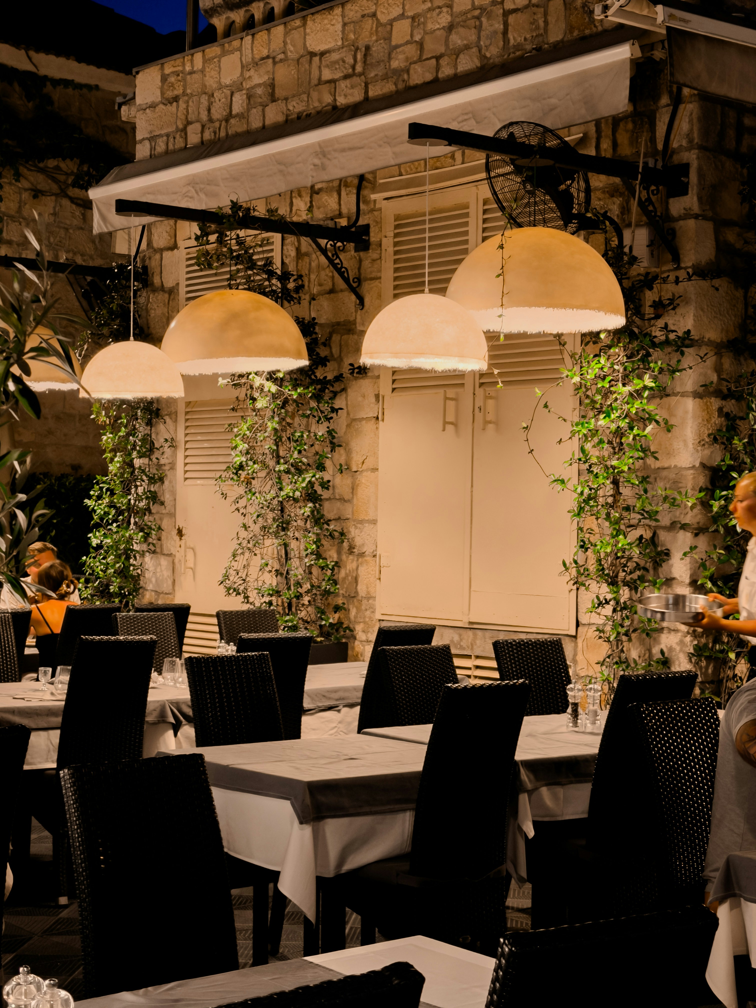 Evening Bistro Under Warm Orbs
