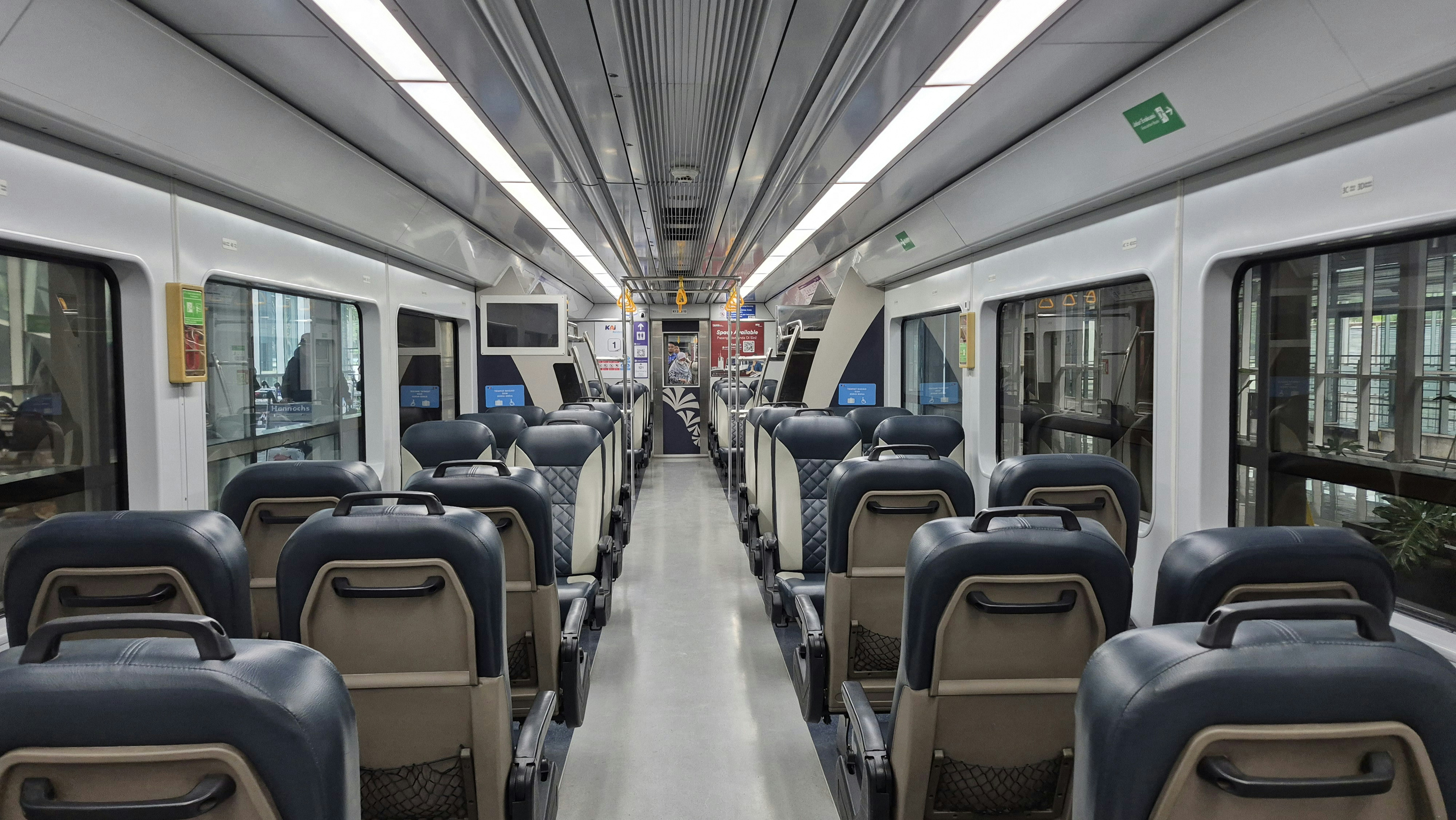 Symmetrical Aisle: Quiet Train Car Vanishing Point