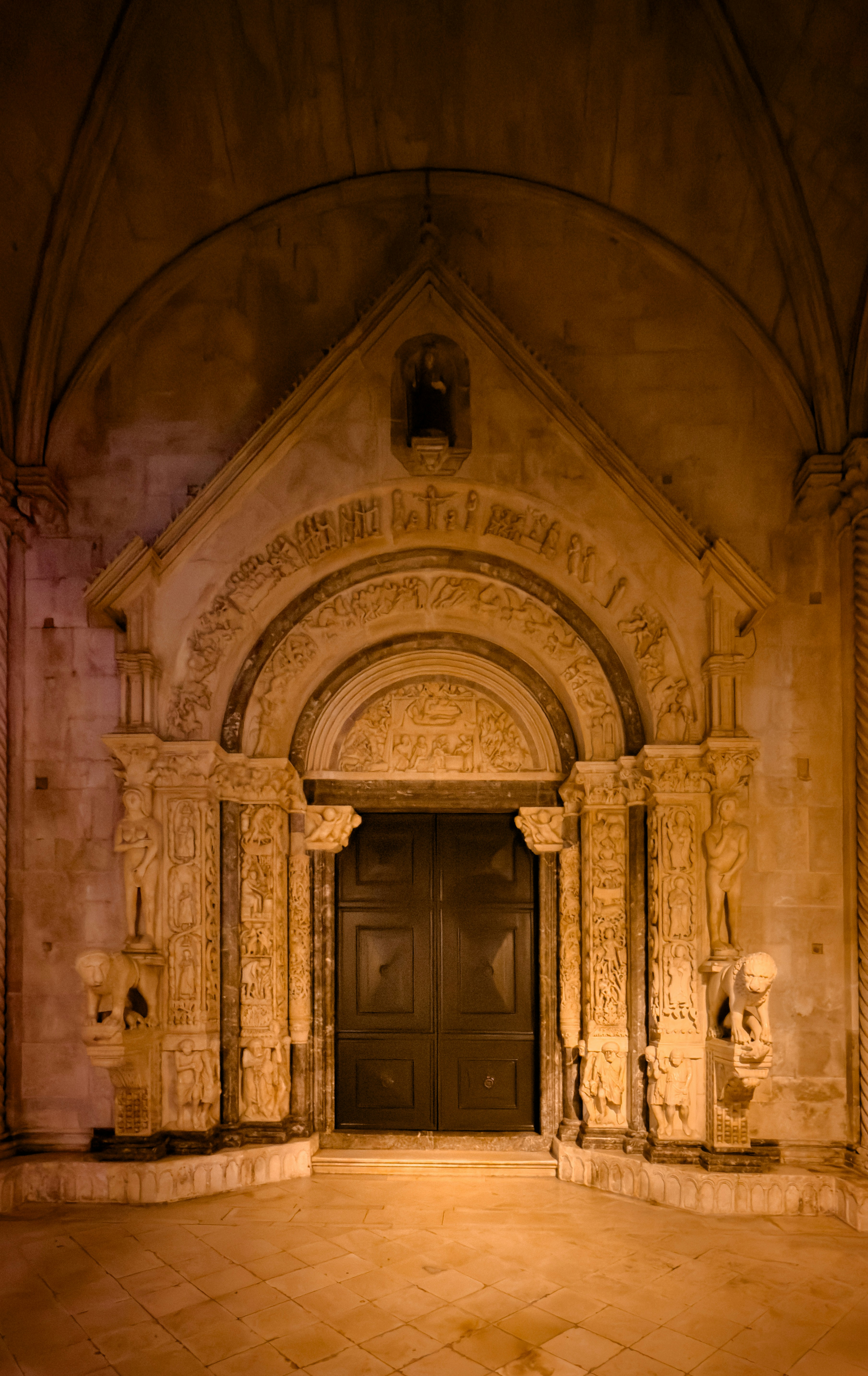 Moonlit Portal: An Ornate Doorway Under Warm Night Glow