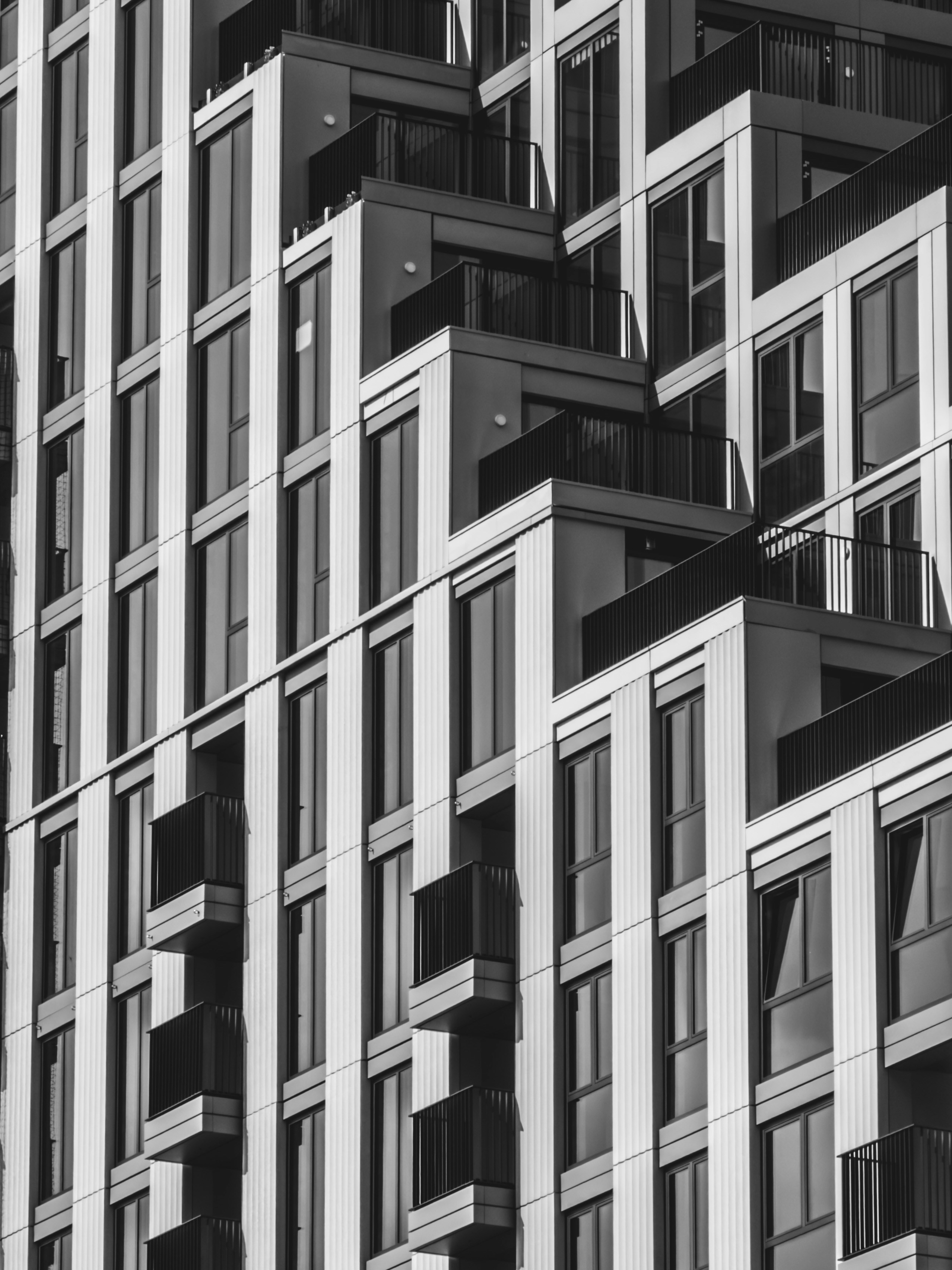 Architectural Tangle: A Monochrome Facade of Interlocking Rectangles