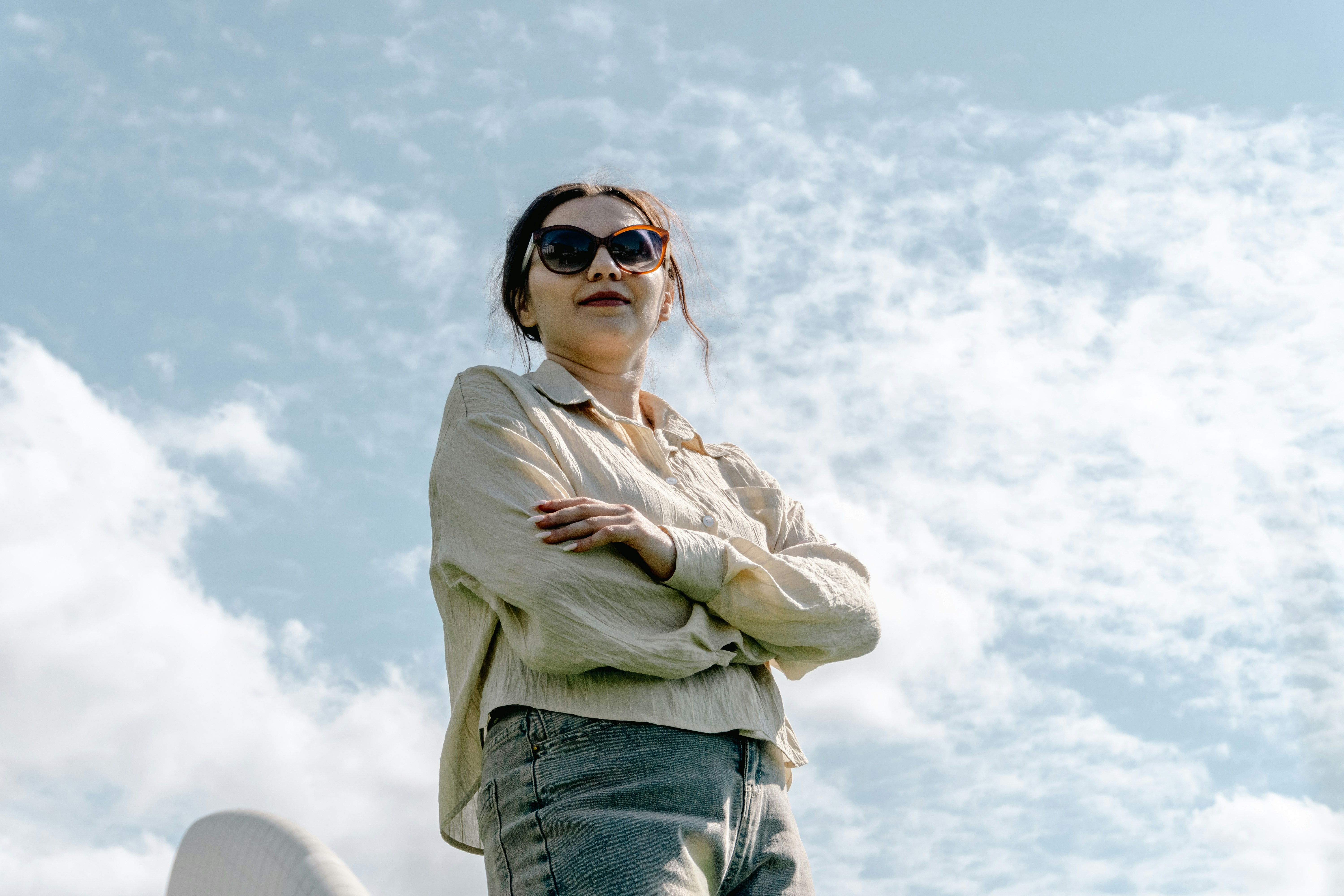 Skyward Stance: Confidence Under Open Clouds