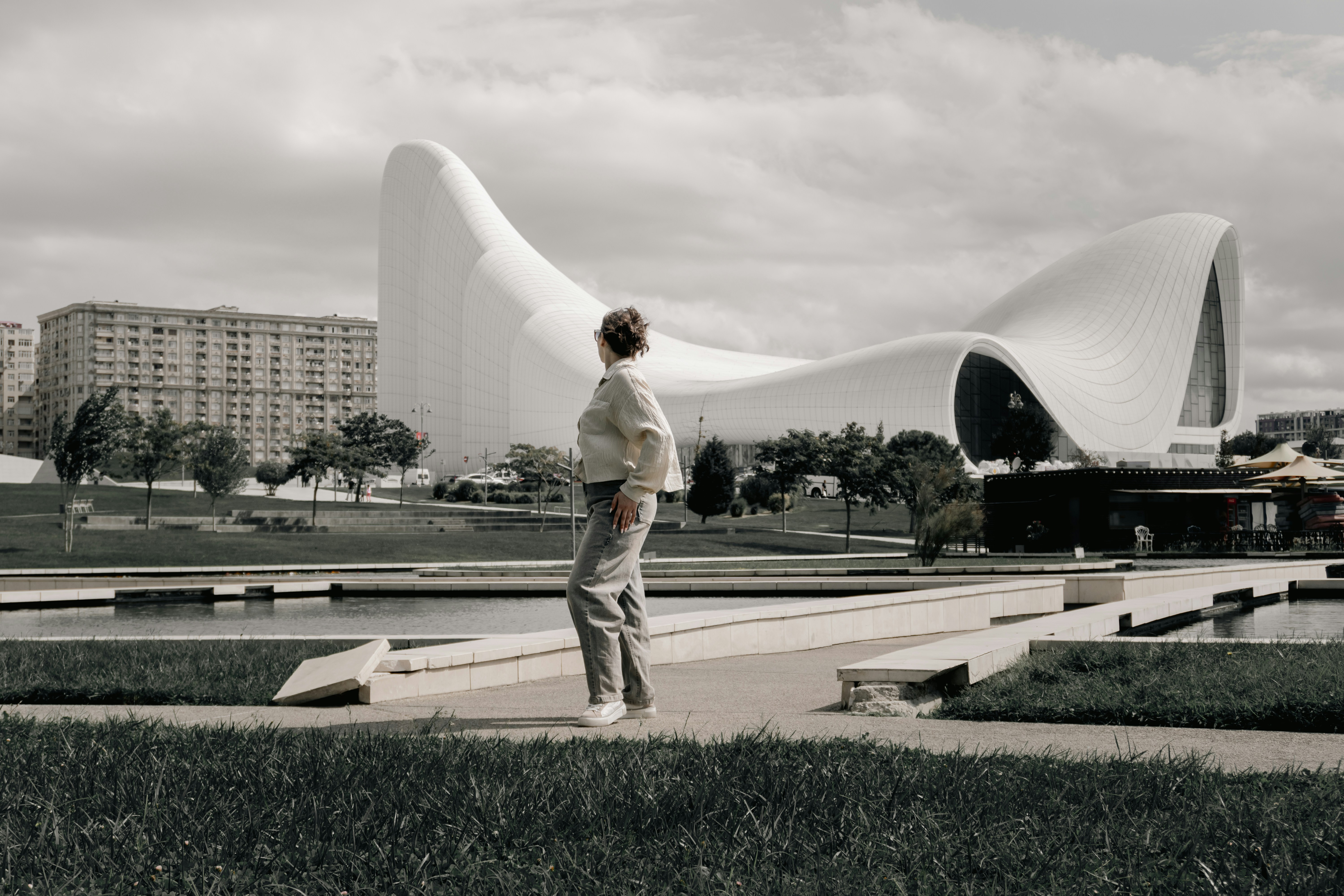 Walking Toward the Wave: A Quiet Moment by the Architecture