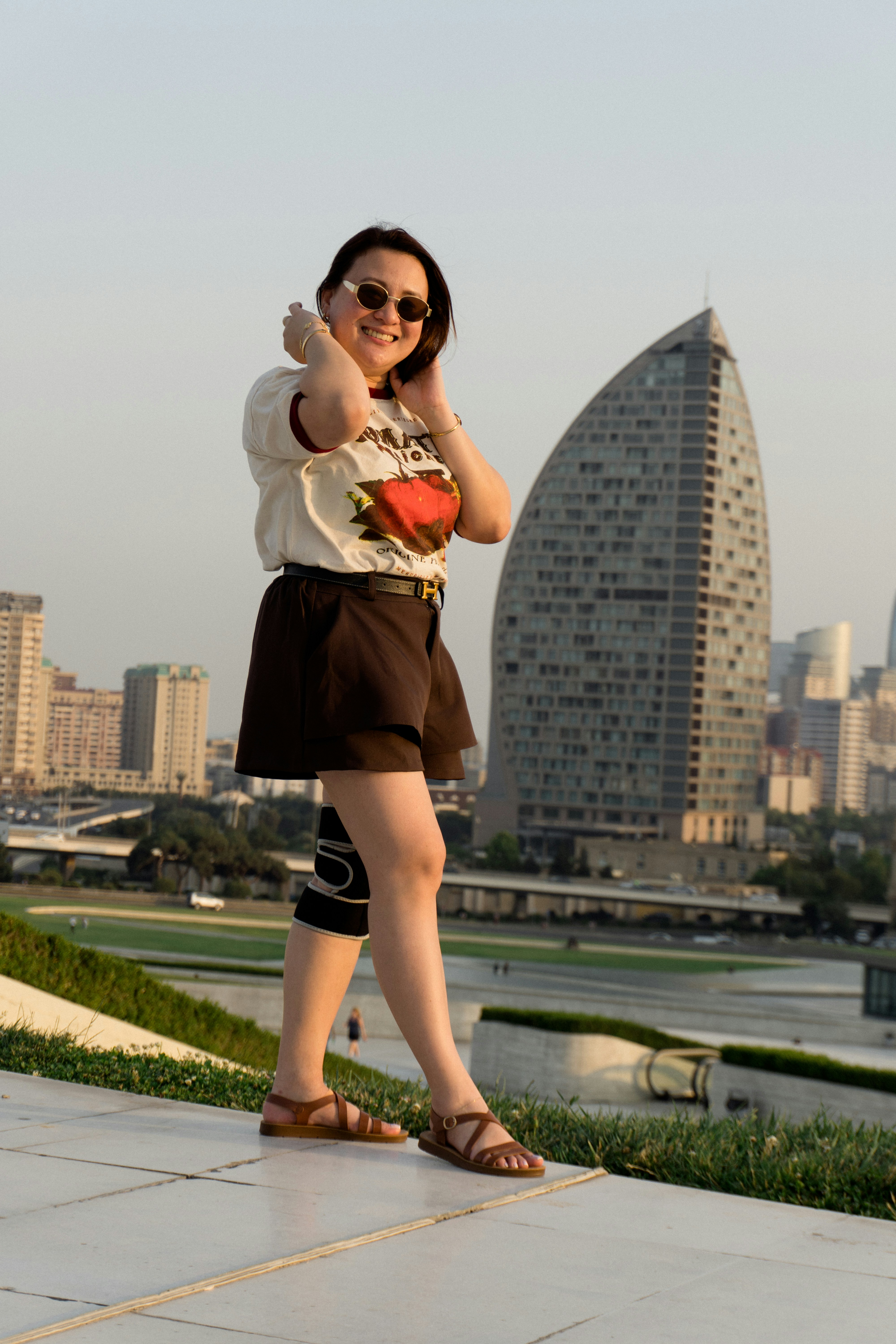 Cityscape Confidence: A Sunlit Stroll by the Marina