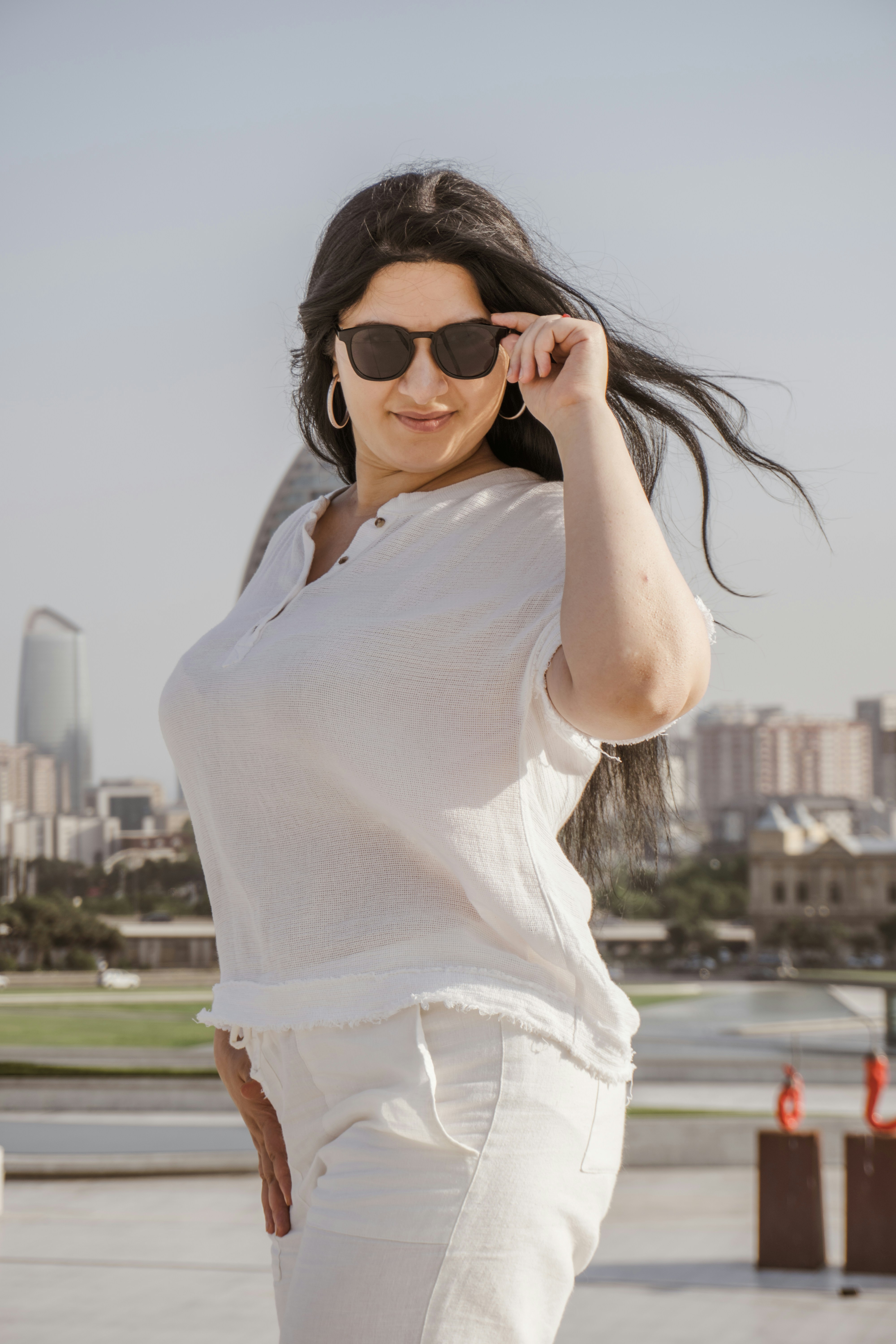 Summertime Confidence: Portrait on an Urban Waterfront