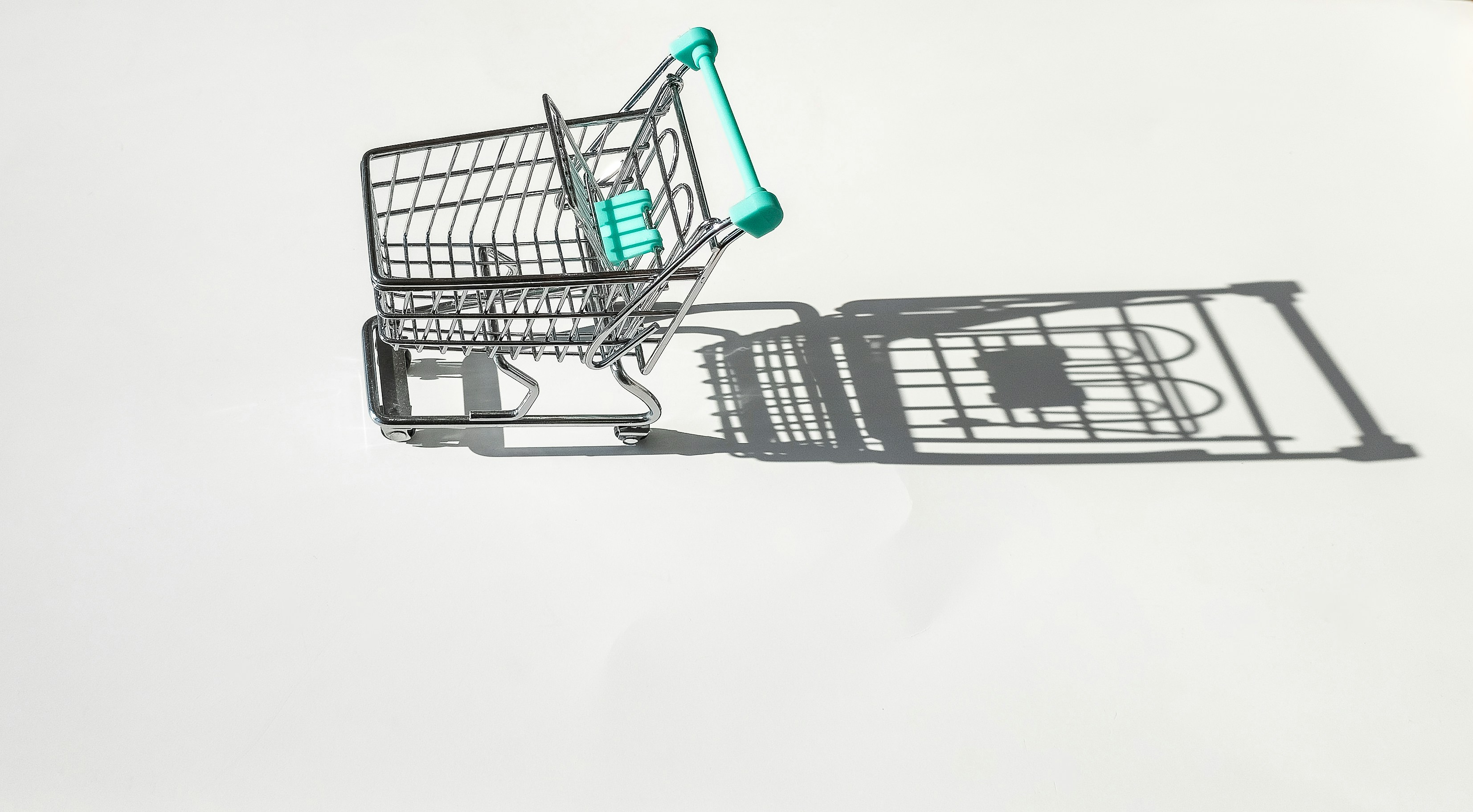Shadow of a Tiny Cart: A Minimalist Play in White and Steel