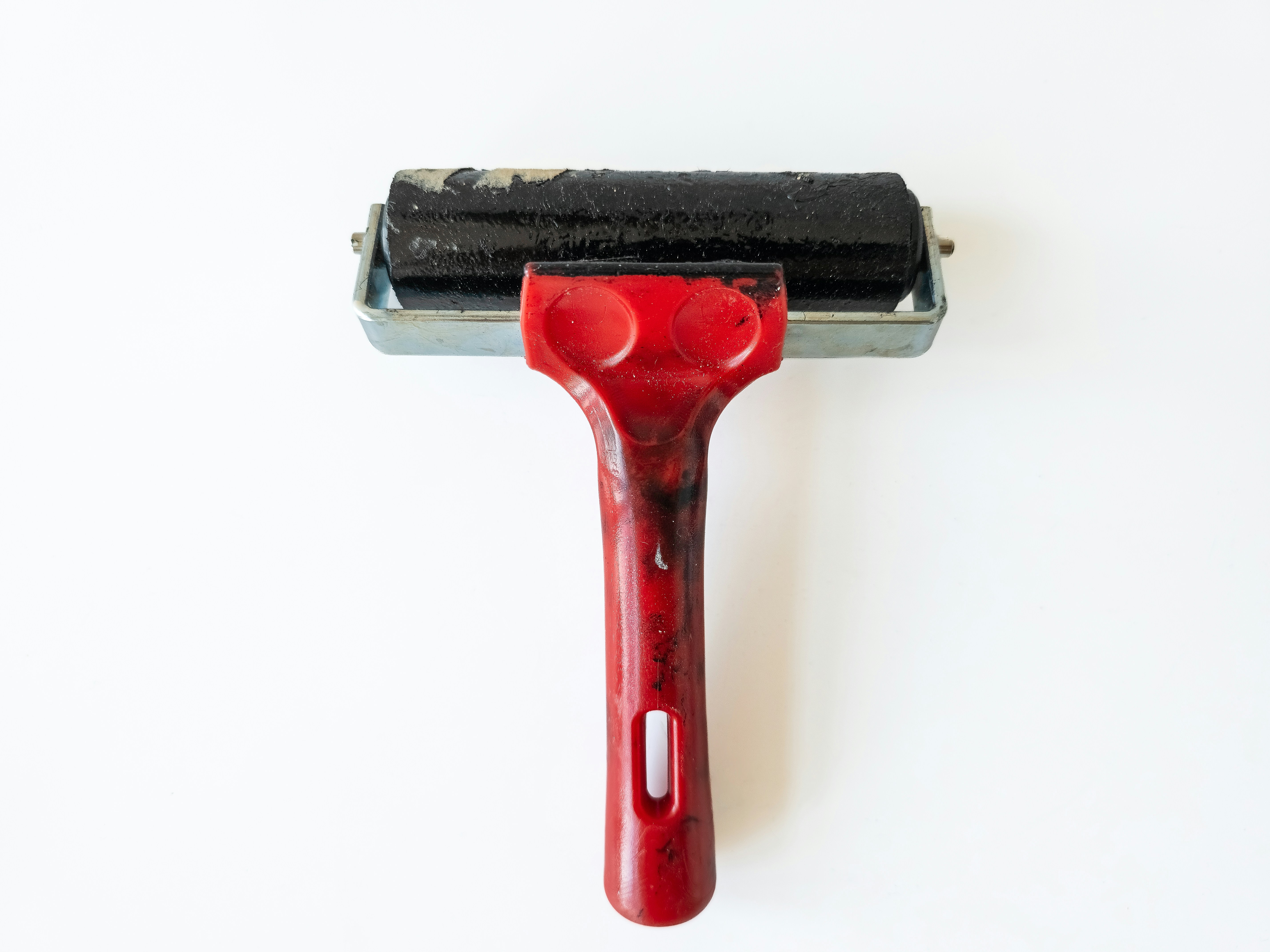 Red Razor: A Minimalist Razor Across a Clean White Canvas