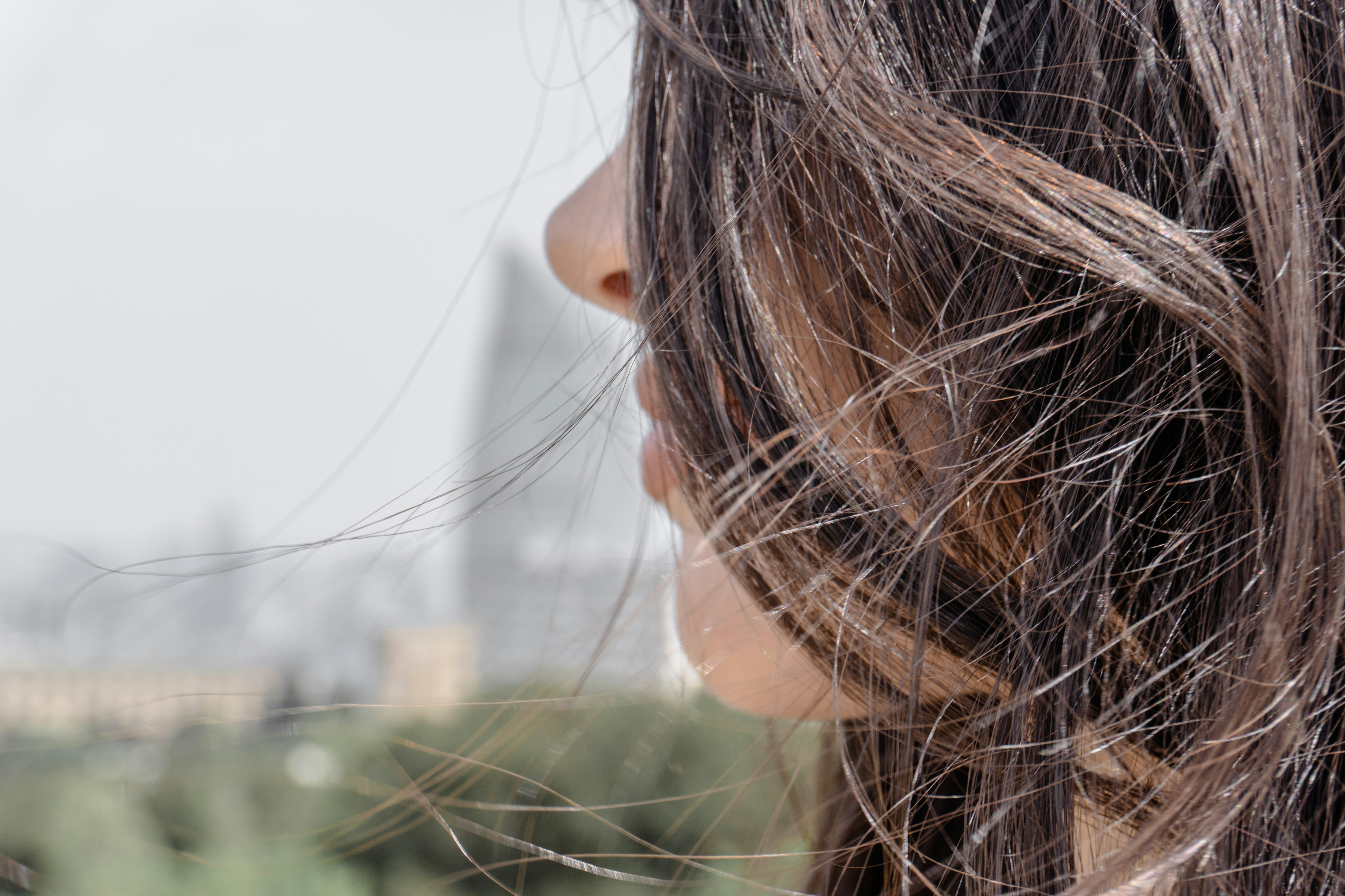 Wind in the Hair: a Quiet Portrait at the Edge of Light
