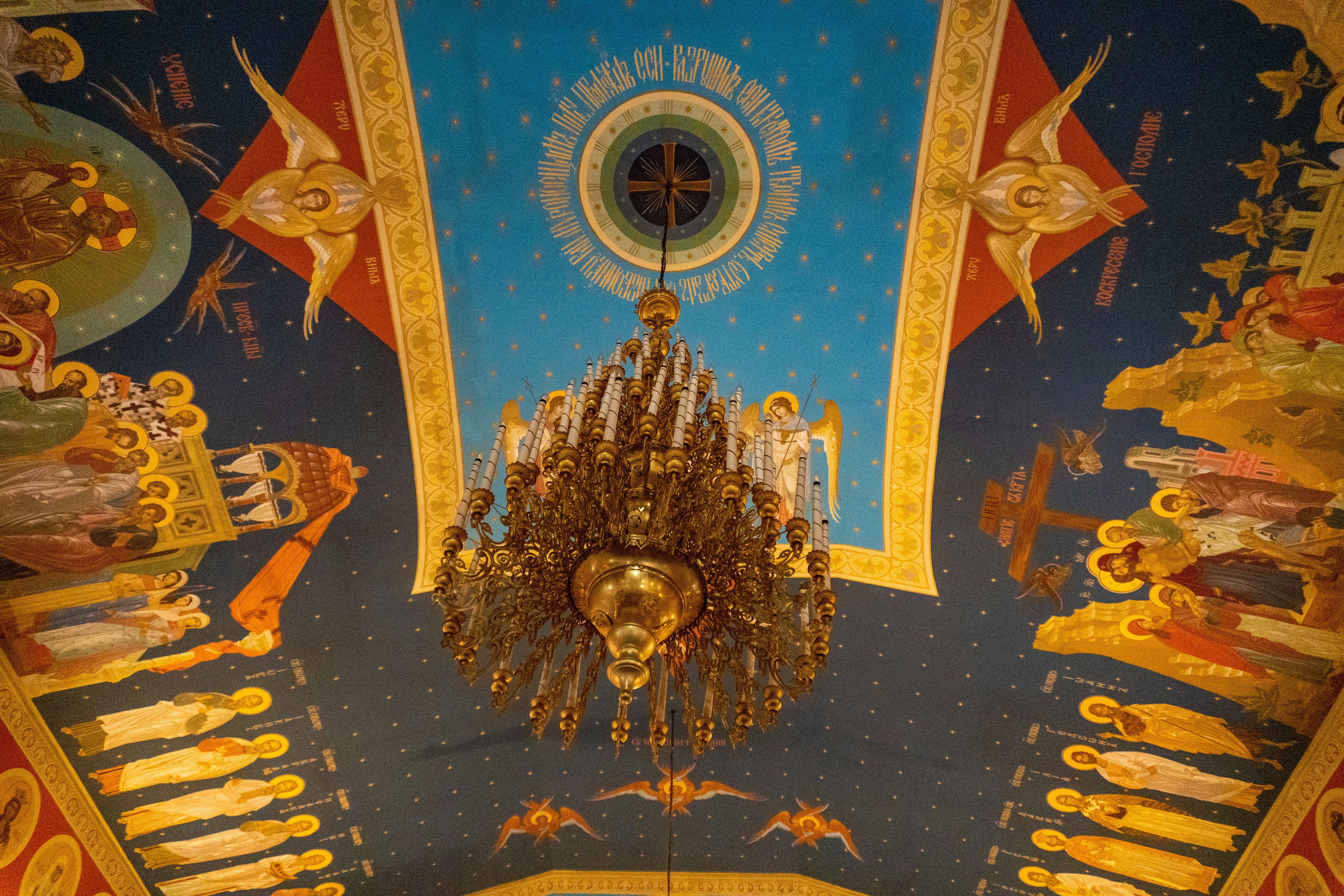 Golden Ceiling Choir: Ornate Chandelier Under a Starry Ceremonial Dome