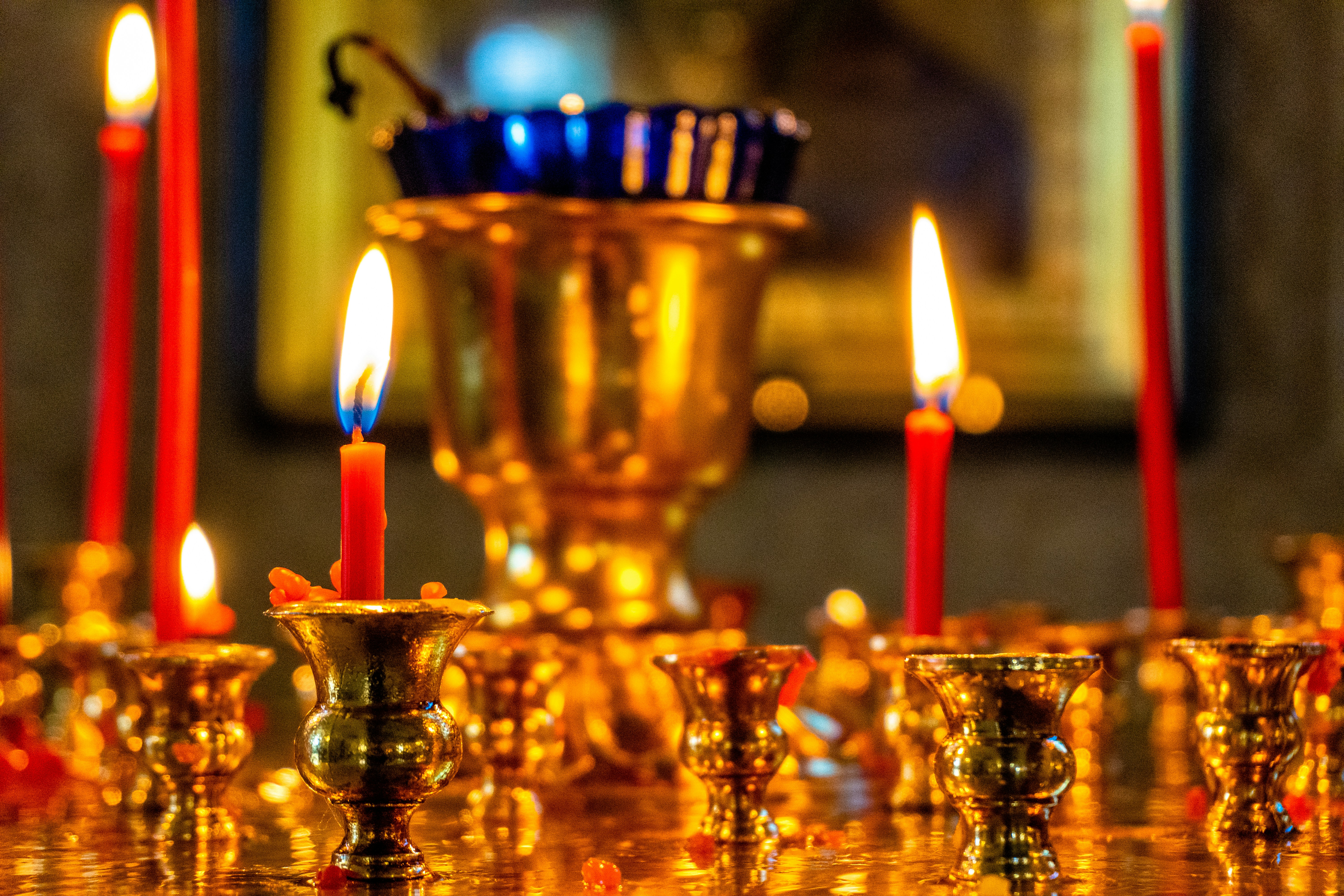 Candles in a Golden Chapel: Warm Rituals on a Reflective Altar