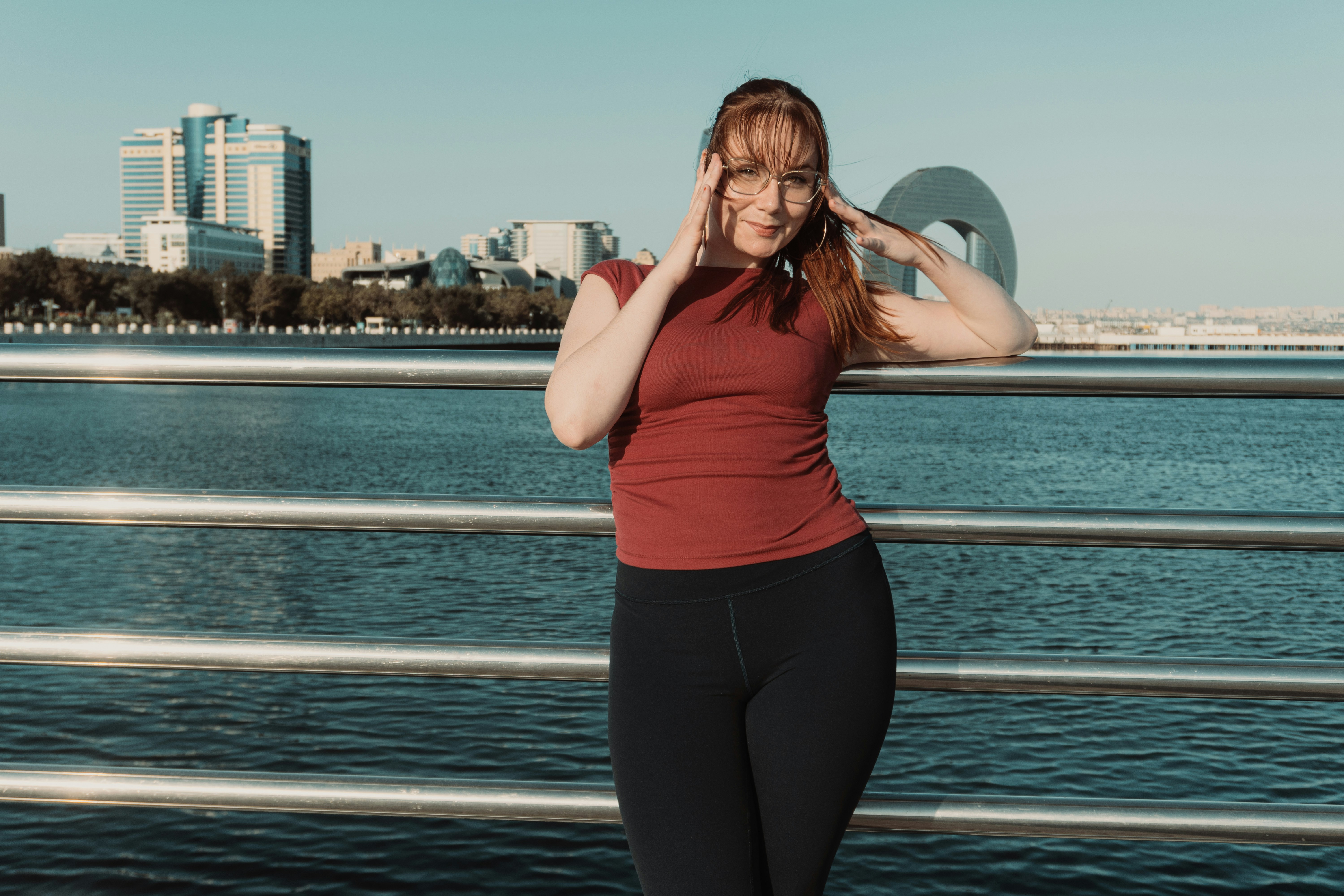 Sunlit Pose by the Waterfront
